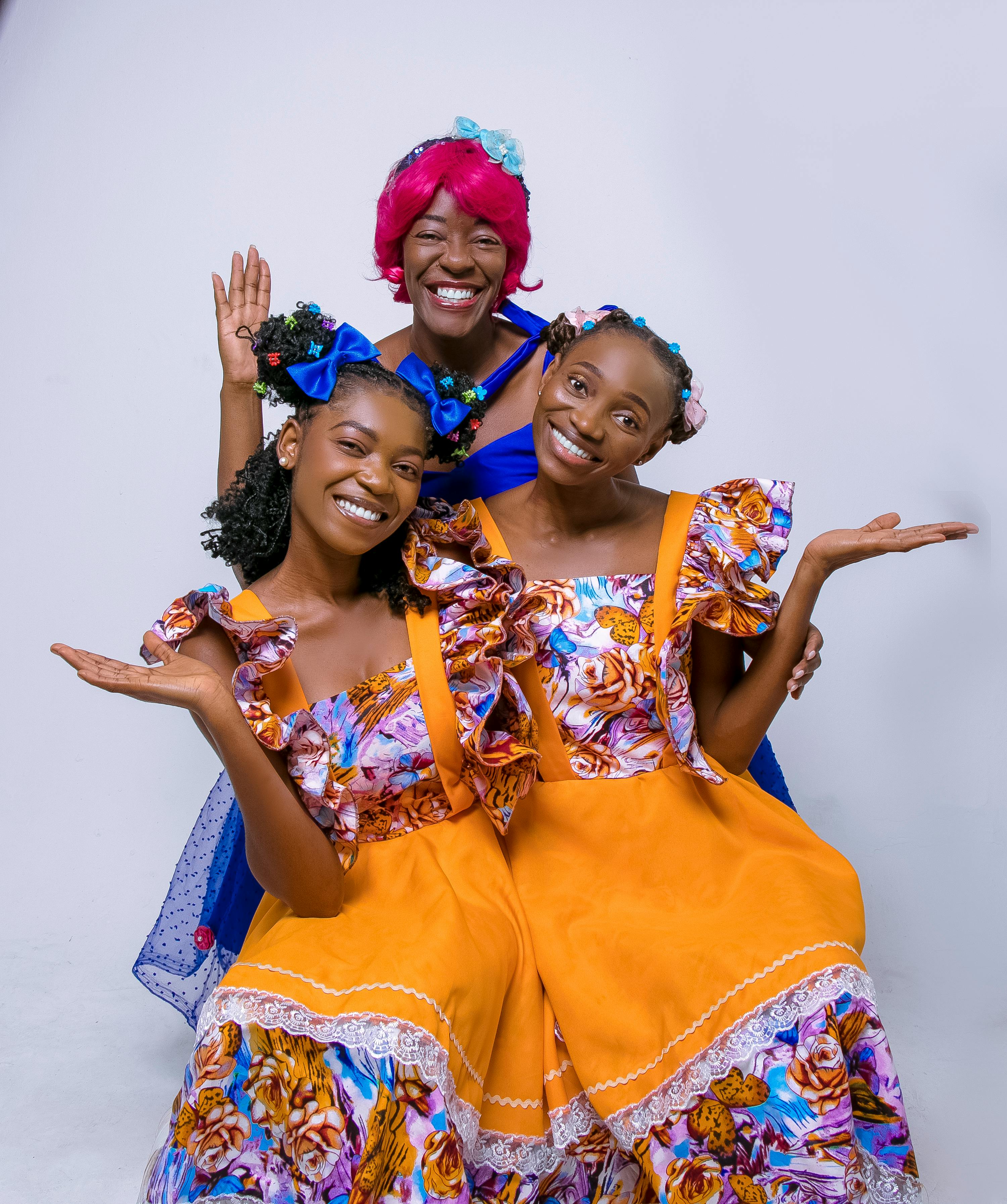 Colorful Portrait of Three Smiling Women in Traditional Dresses · Free ...