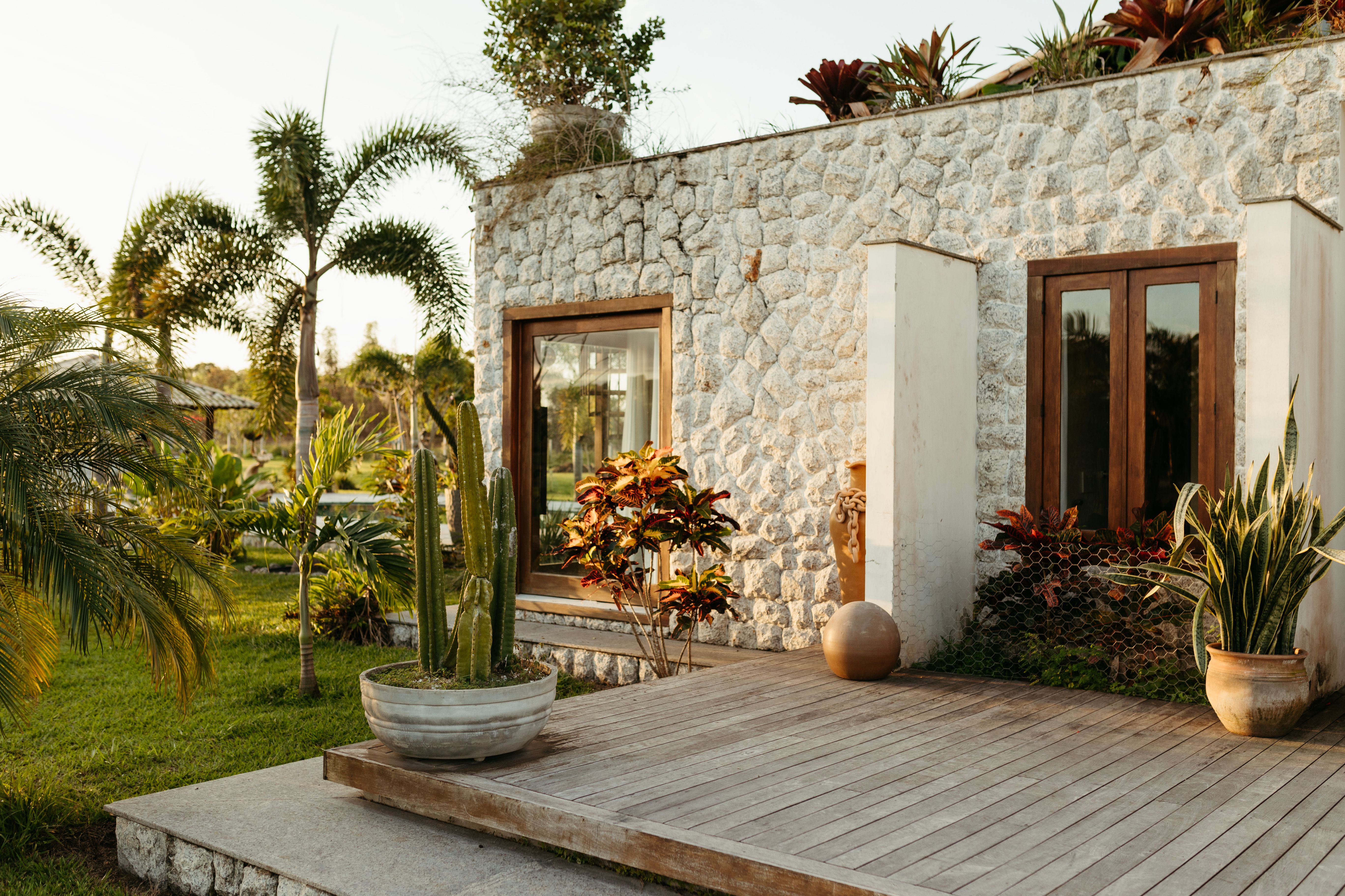 Modern Stone Villa with Lush Tropical Garden · Free Stock Photo