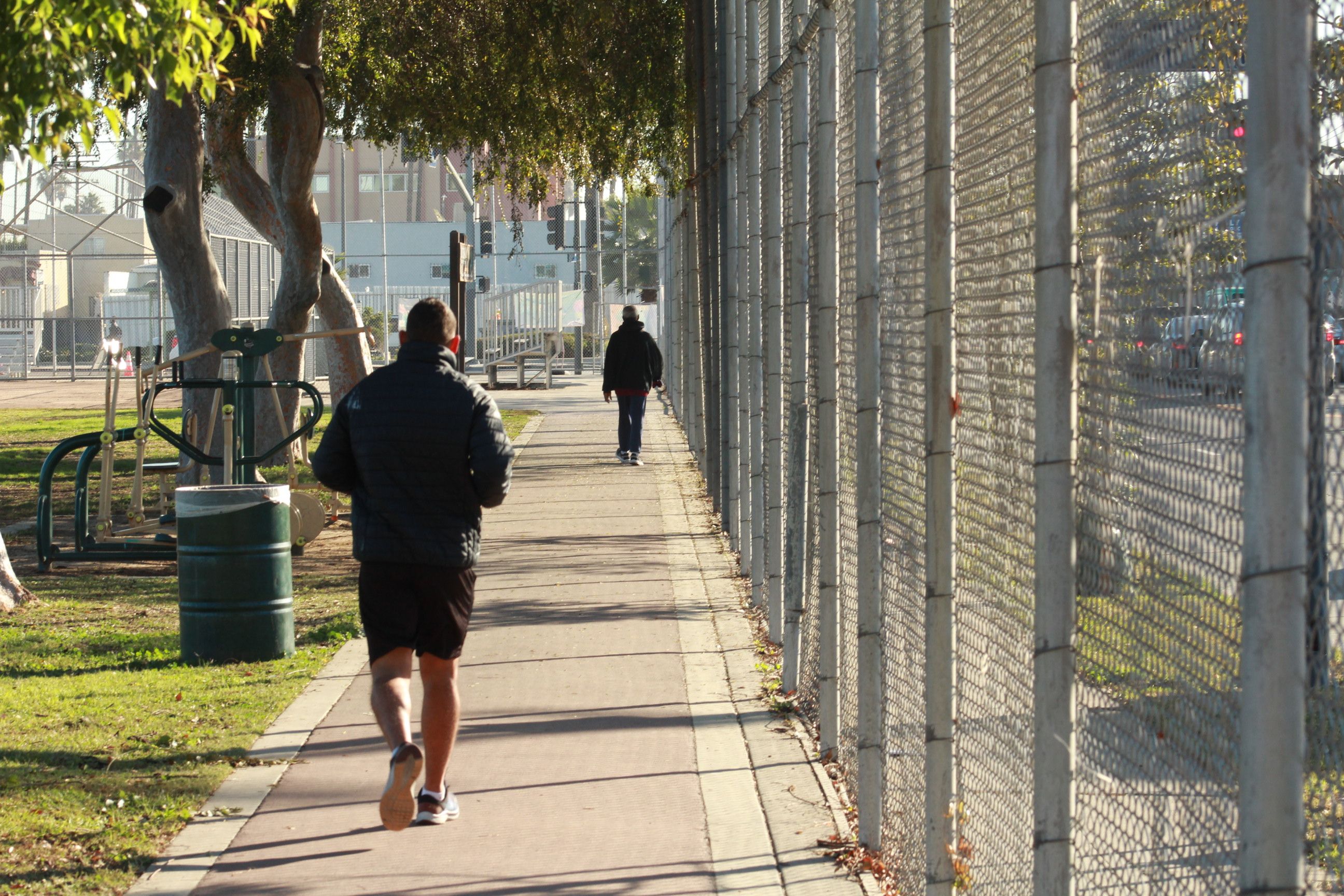 Joggers on Los Angeles Sidewalk Morning Scene · Free Stock Photo
