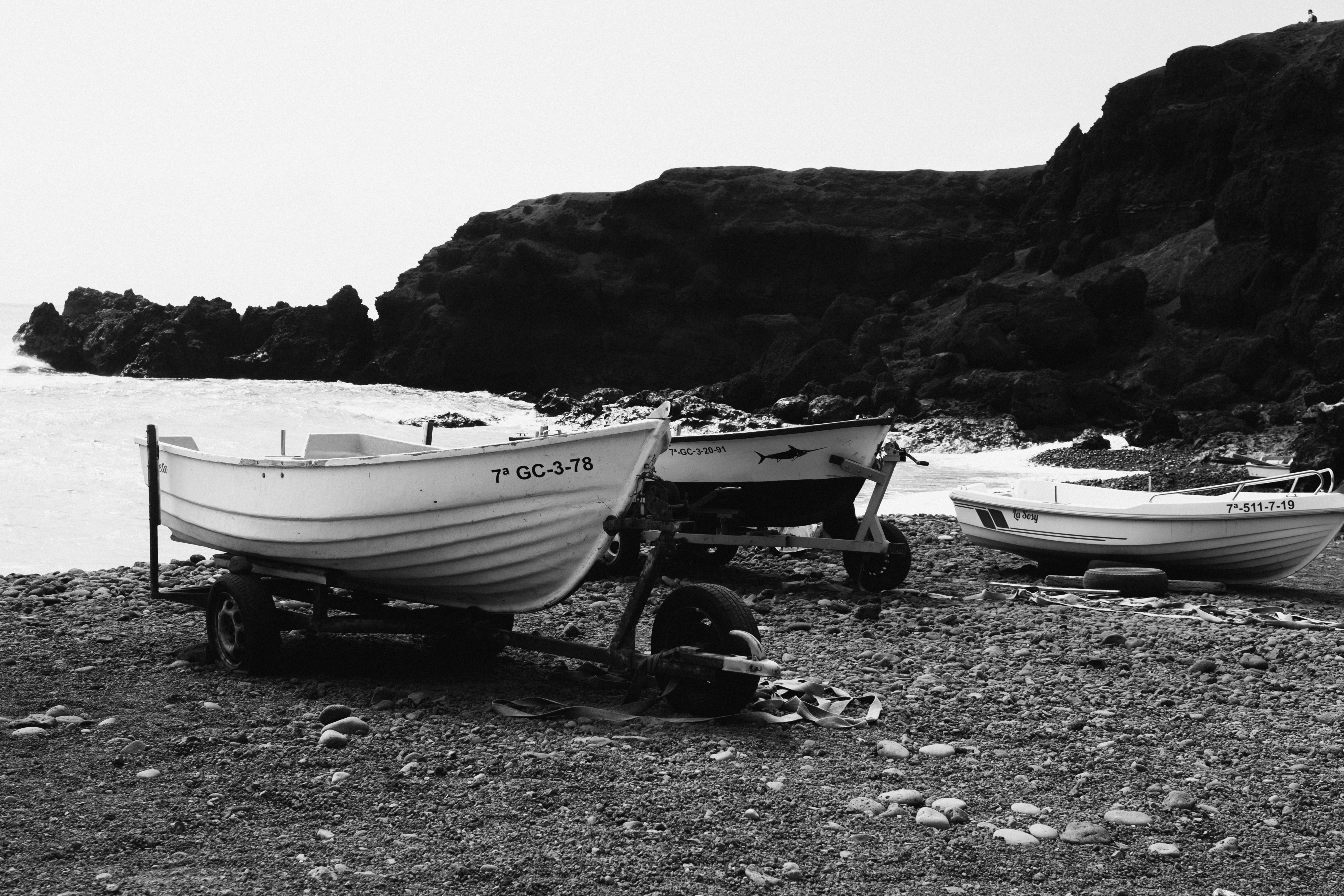 Black and White Shoreline Boats in Lanzarote · Free Stock Photo