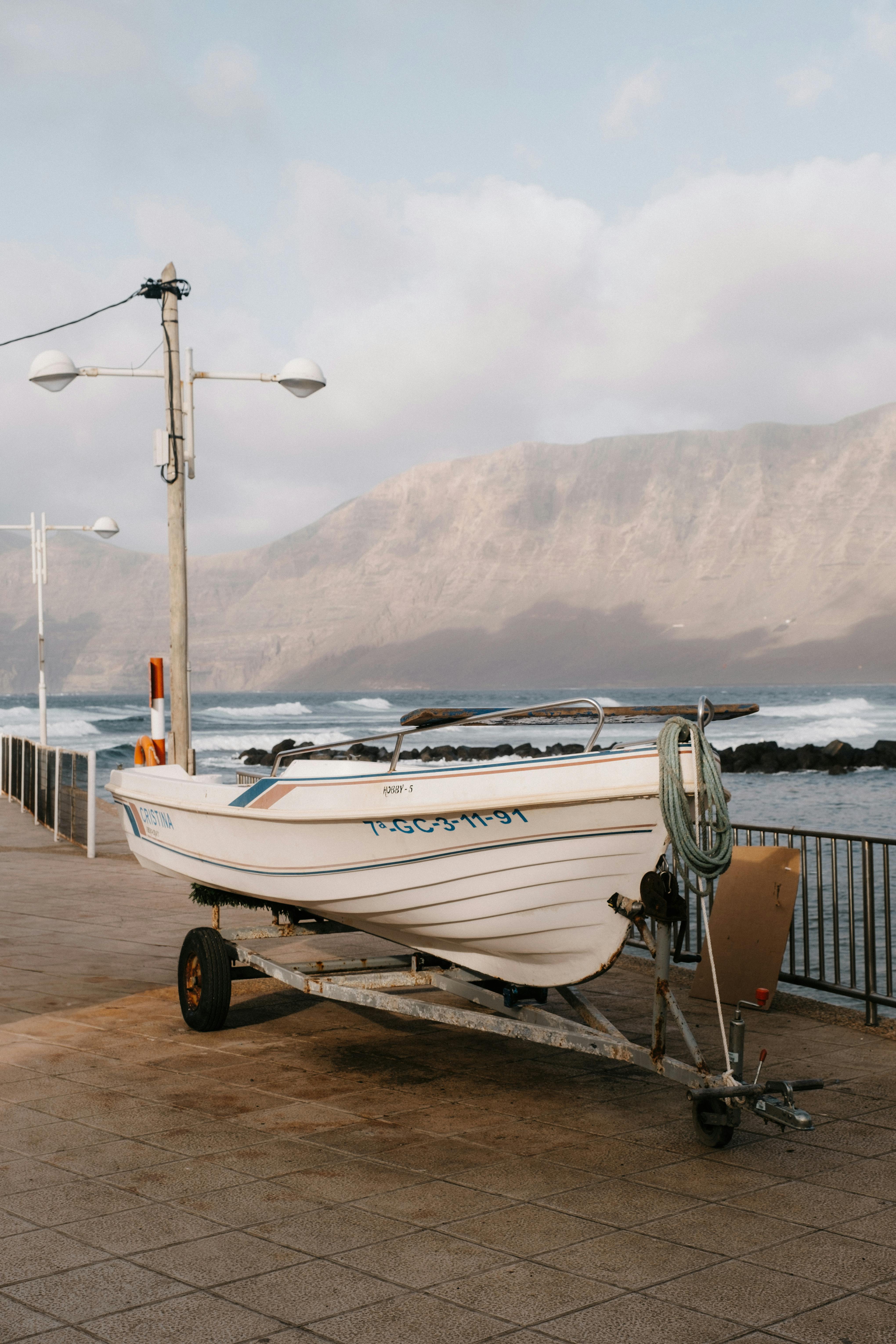 White Boat on Lanzarote Coastal Pathway · Free Stock Photo