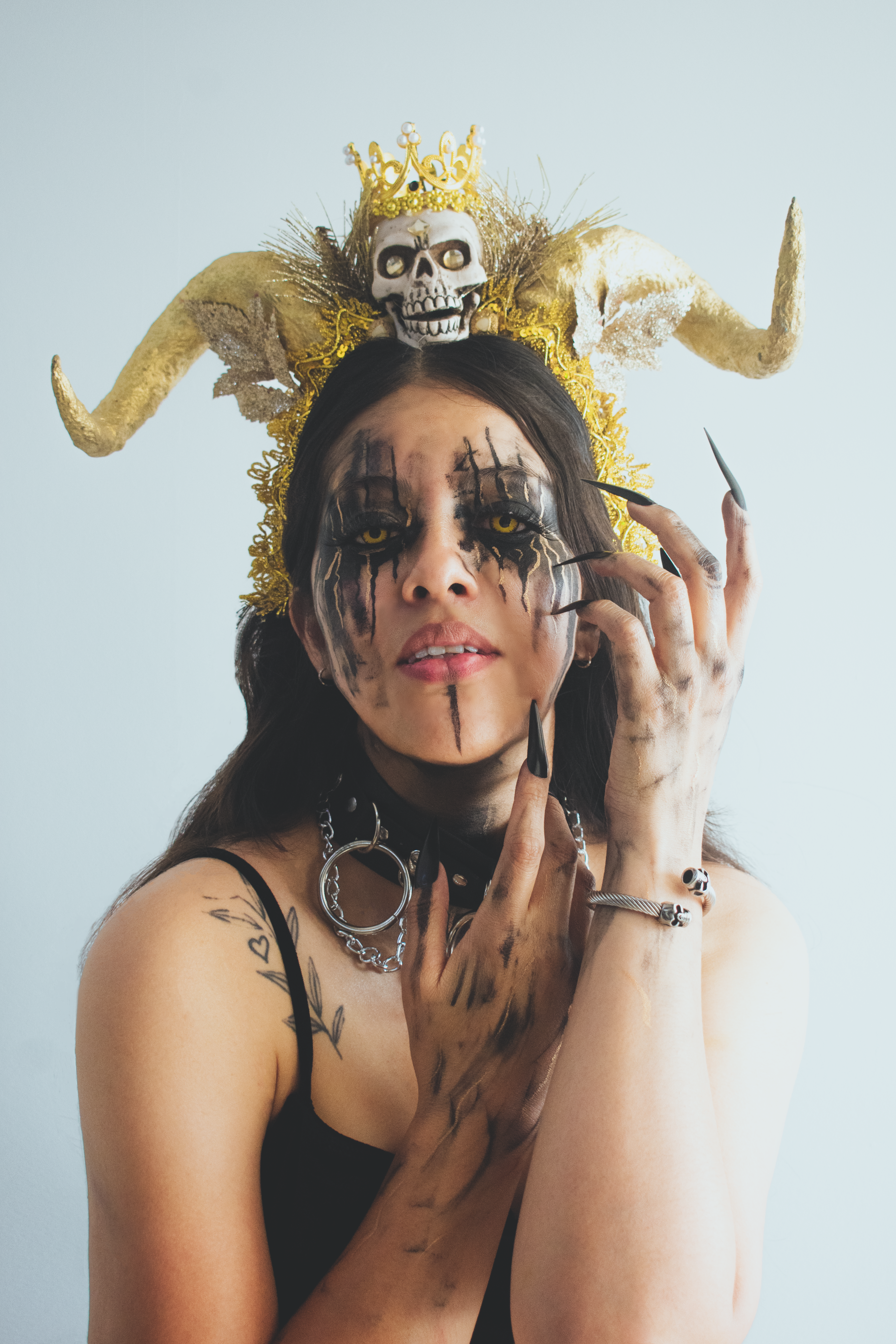 Dark Thematic Portrait with Skull Crown · Free Stock Photo