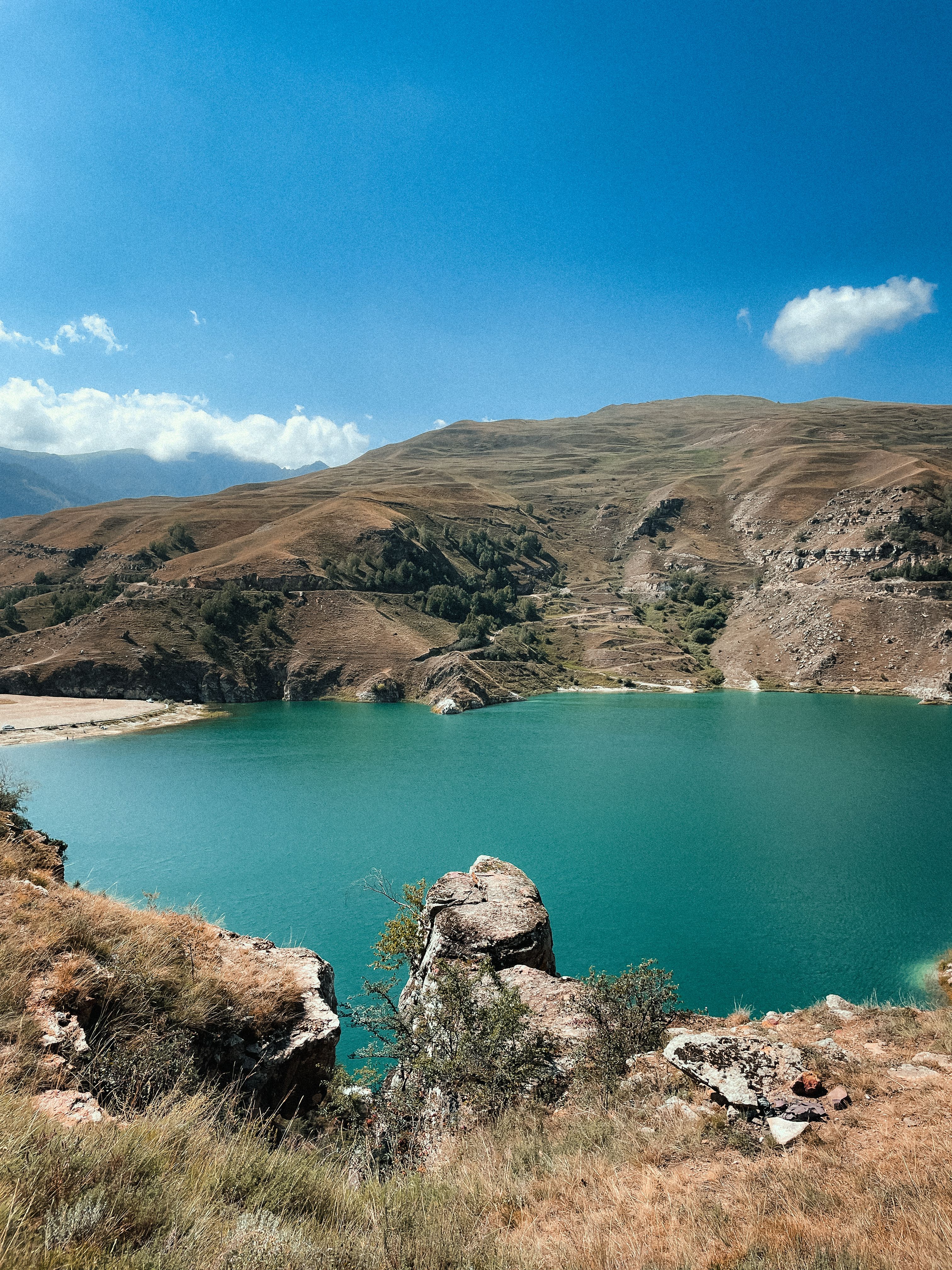 Scenic View of Turquoise Mountain Lake · Free Stock Photo