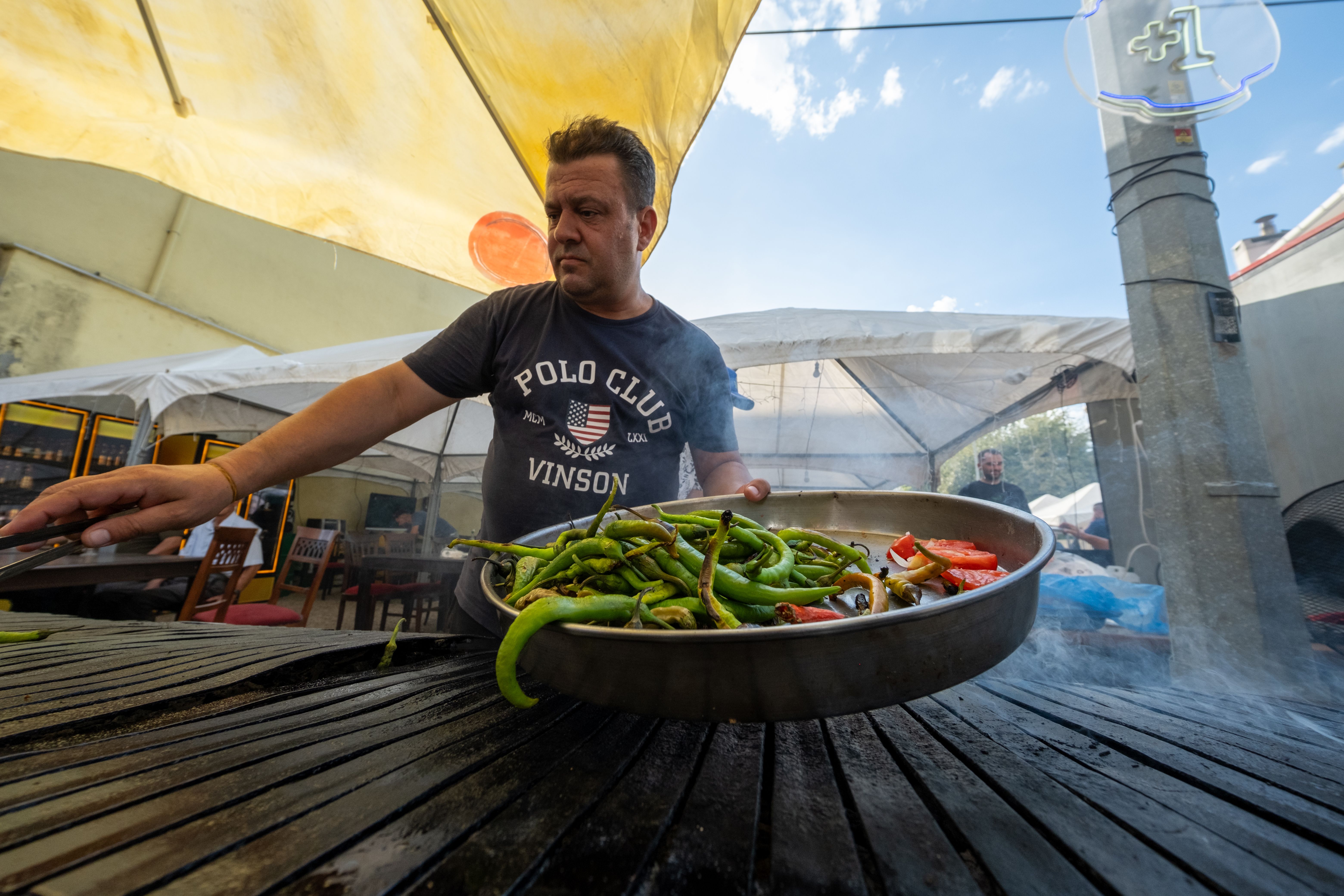 Outdoor Grilling Scene with Fresh Vegetables · Free Stock Photo