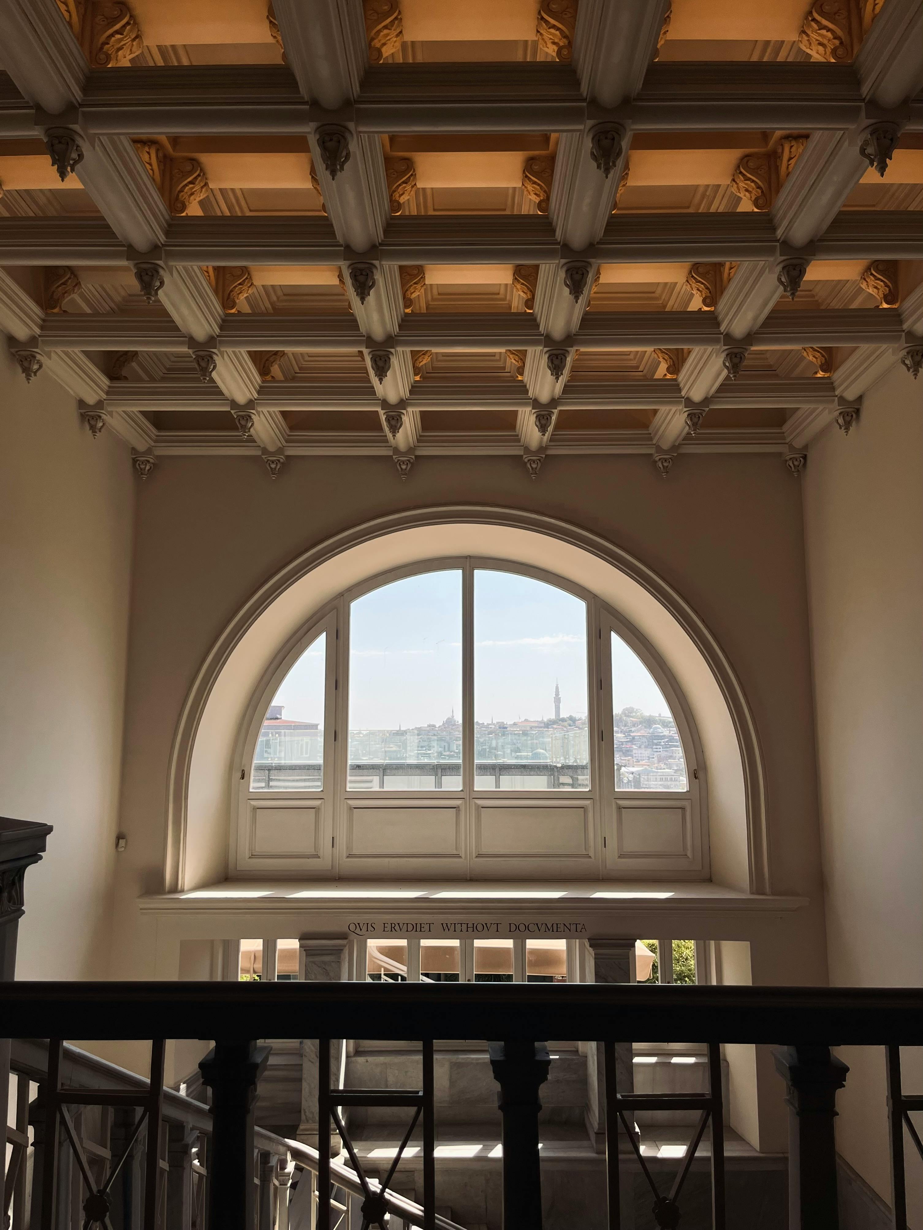 Elegant Interior with Arched Window View · Free Stock Photo