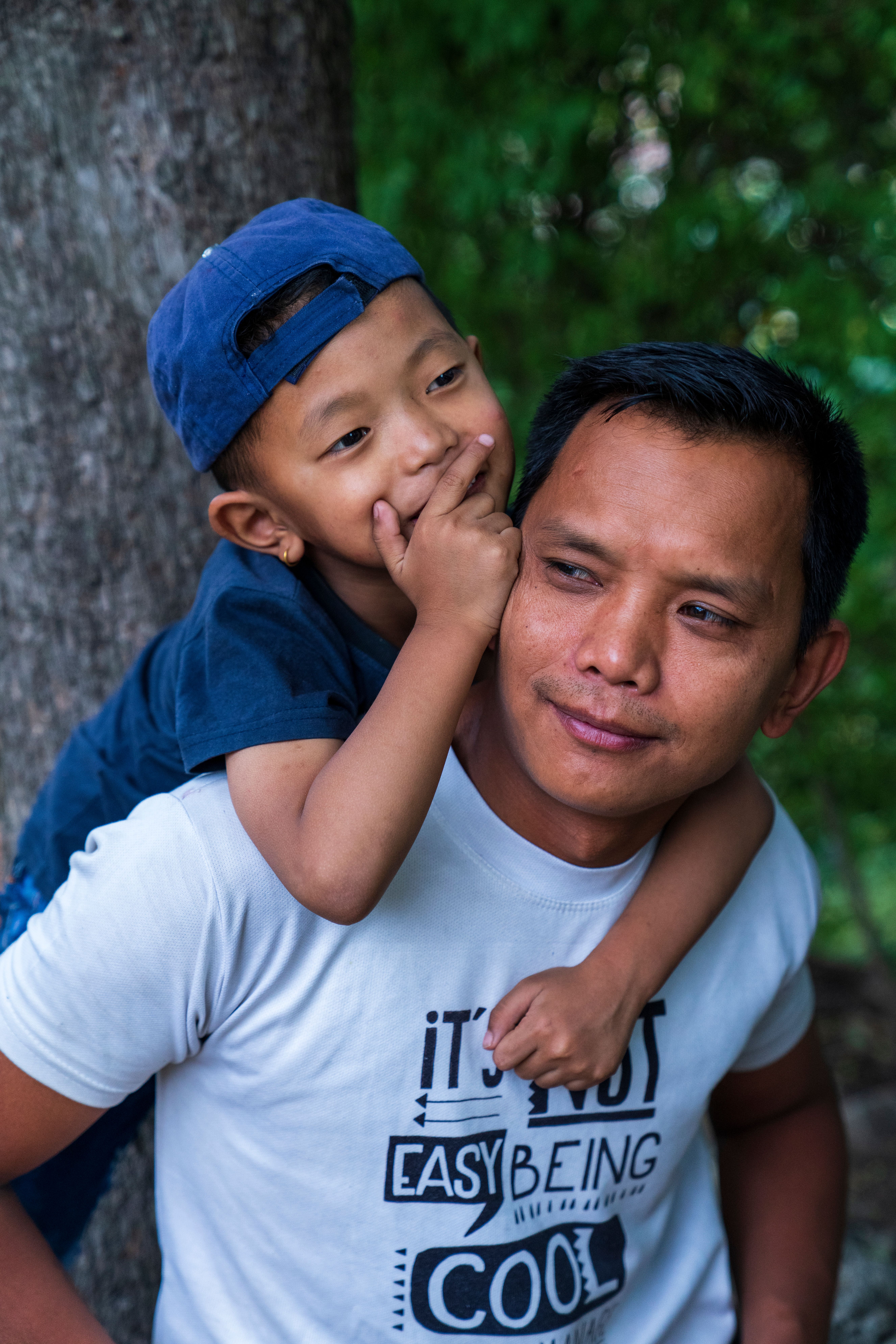 Father and Son Enjoying Outdoor Bonding Time · Free Stock Photo