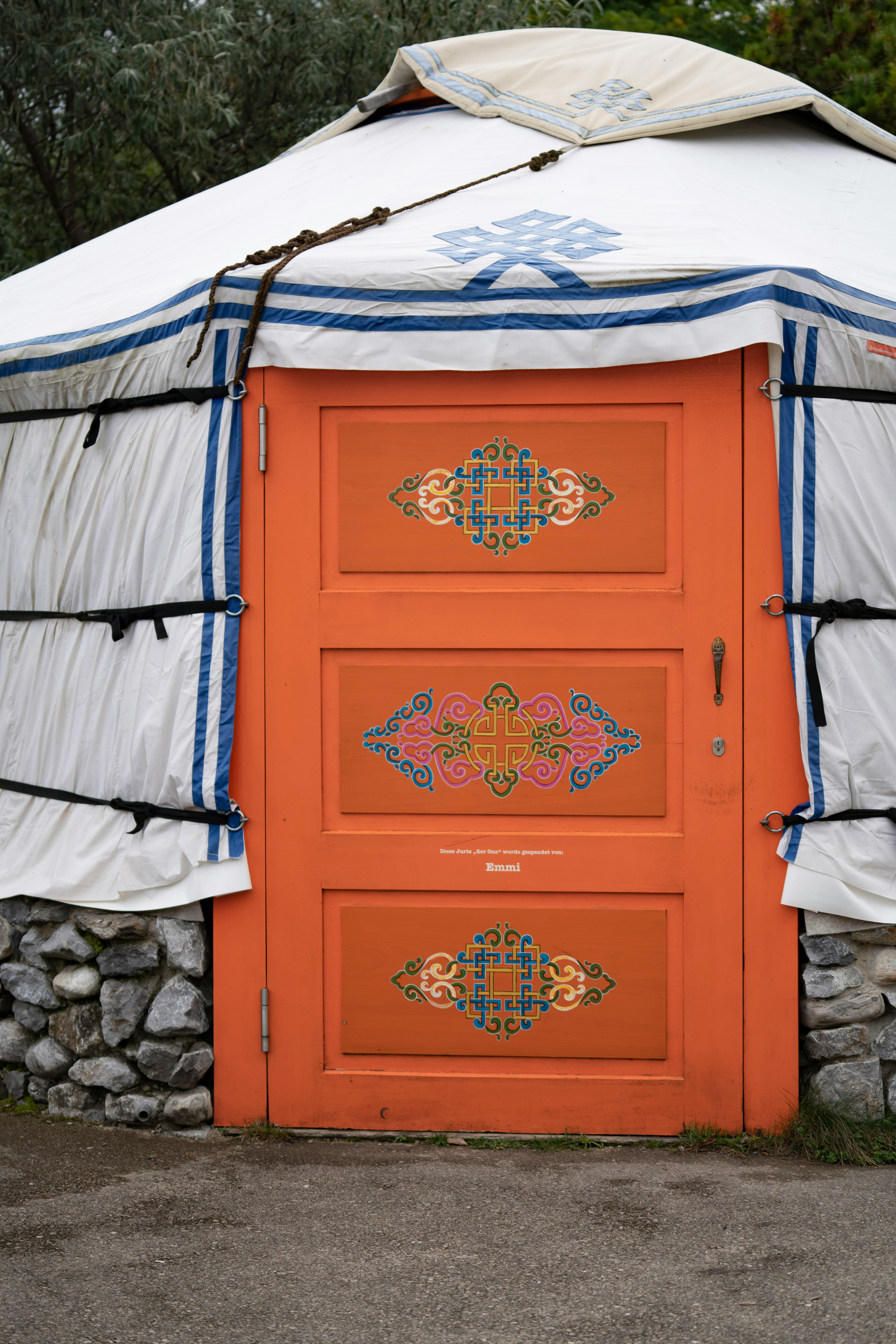 Traditional Mongolian Yurt with Ornate Door · Free Stock Photo