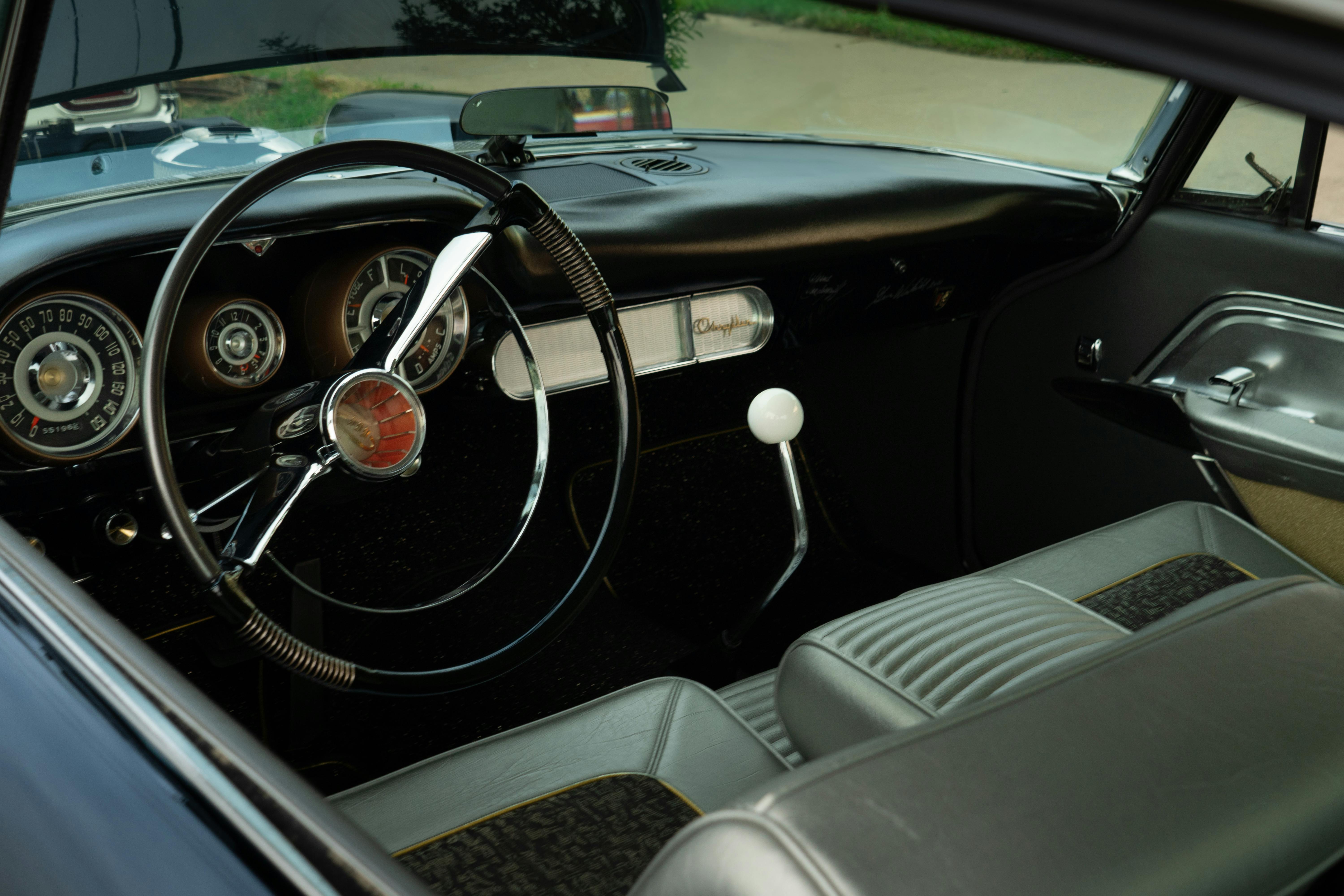 Vintage Car Interior with Classic Steering Wheel · Free Stock Photo
