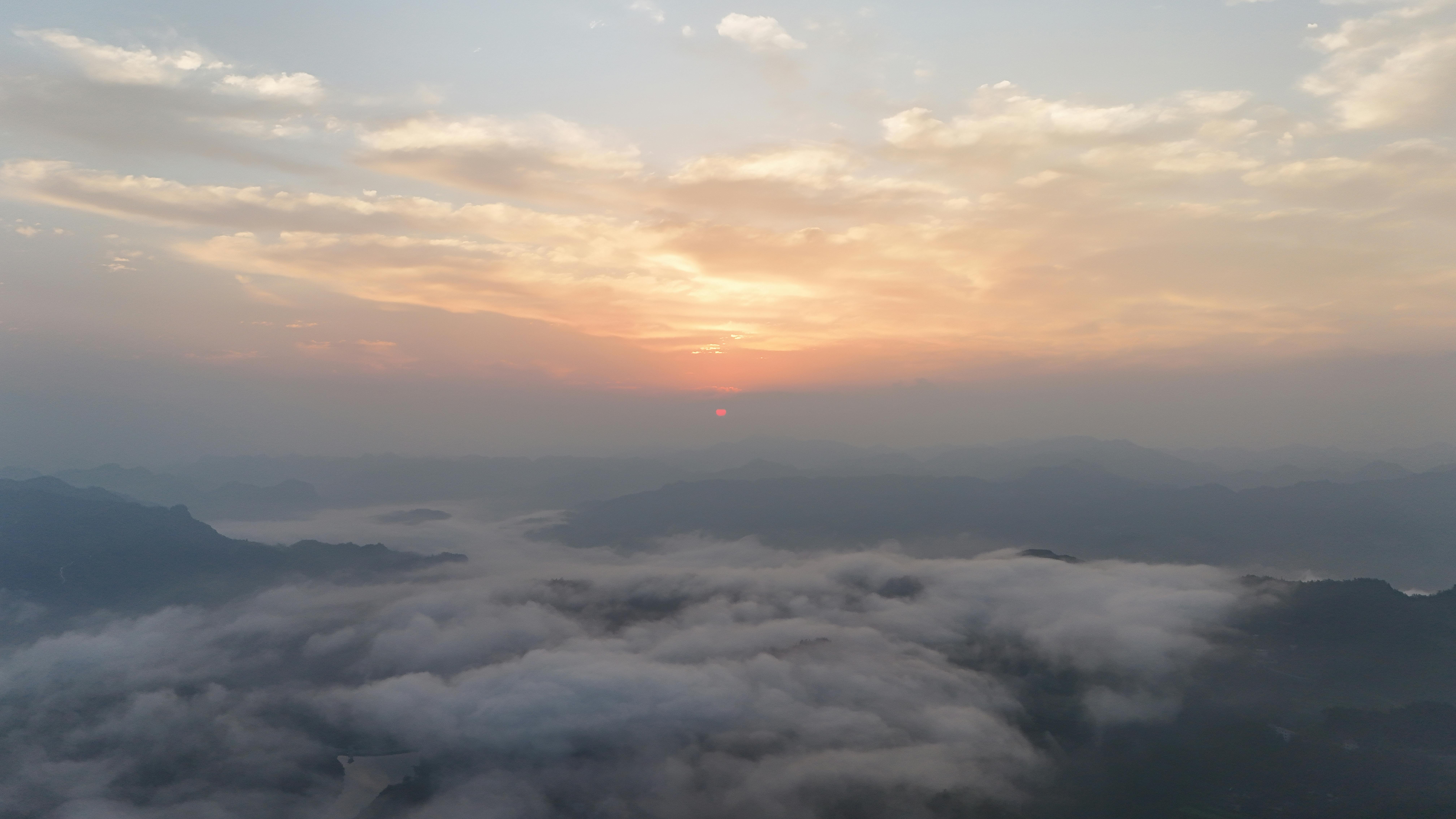 Scenic Aerial View of Misty Mountains at Sunrise · Free Stock Photo