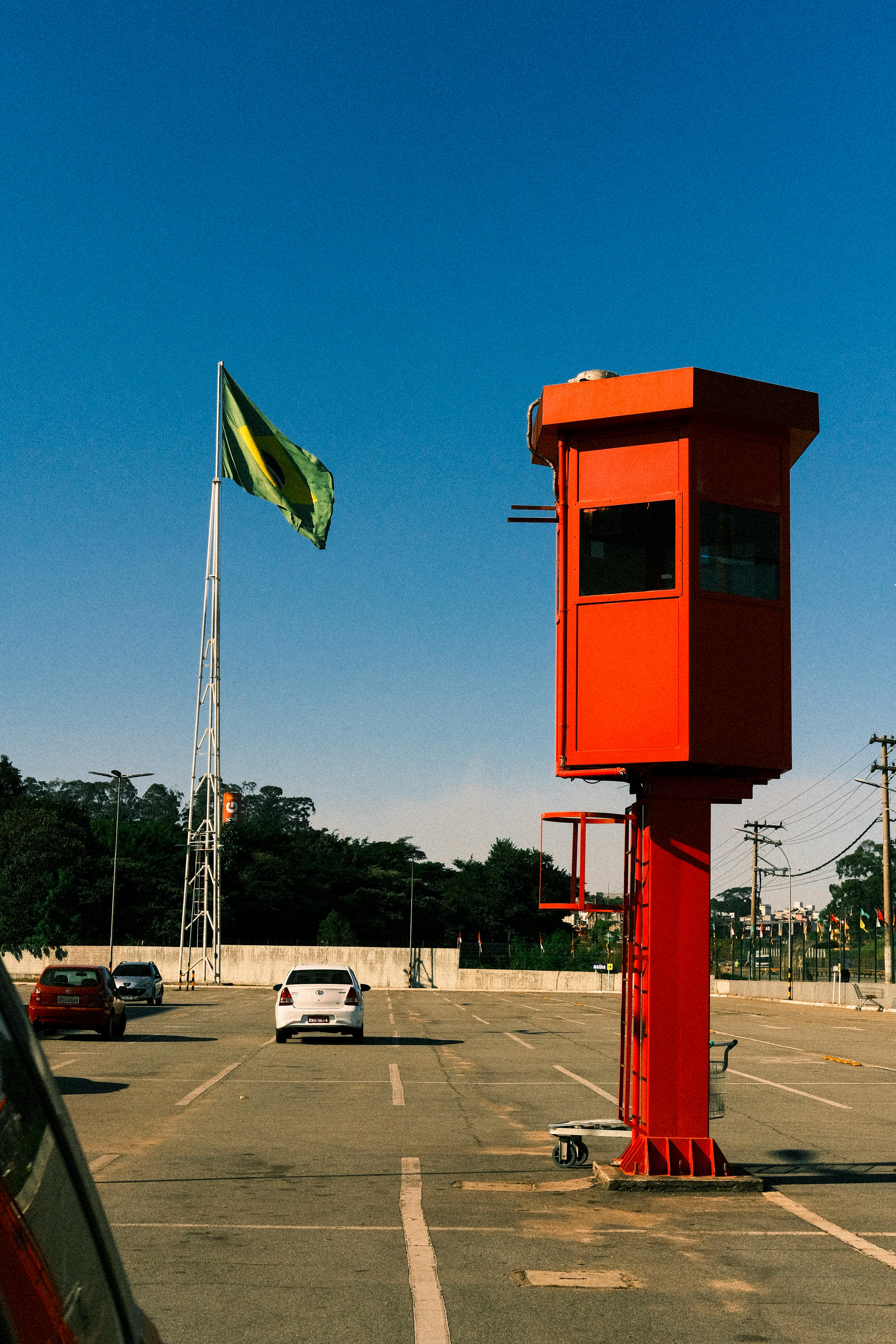 Red Traffic Control Tower in São Paulo Parking Lot · Free Stock Photo
