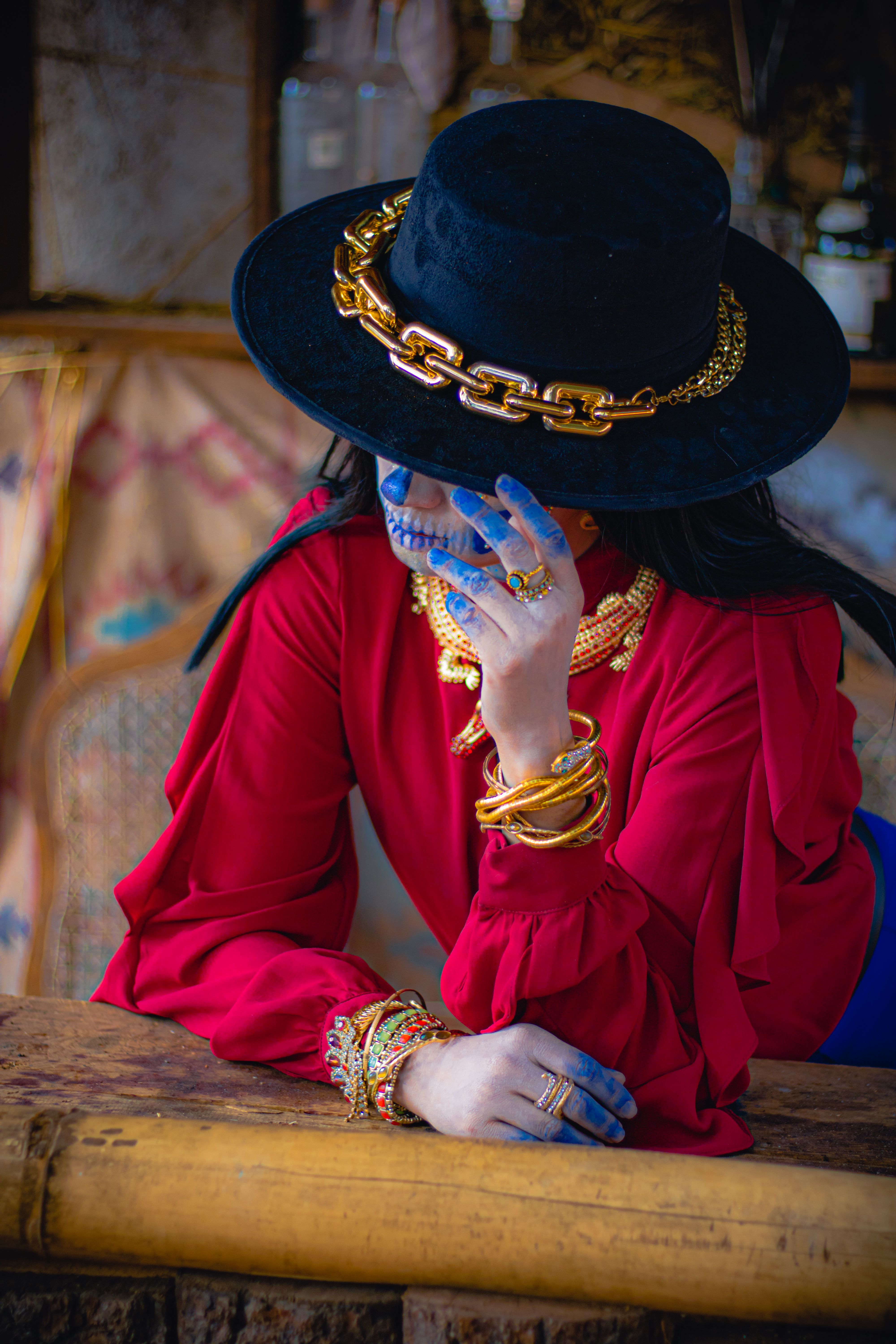 Traditional Dia de Muertos Catrina in Red Outfit · Free Stock Photo