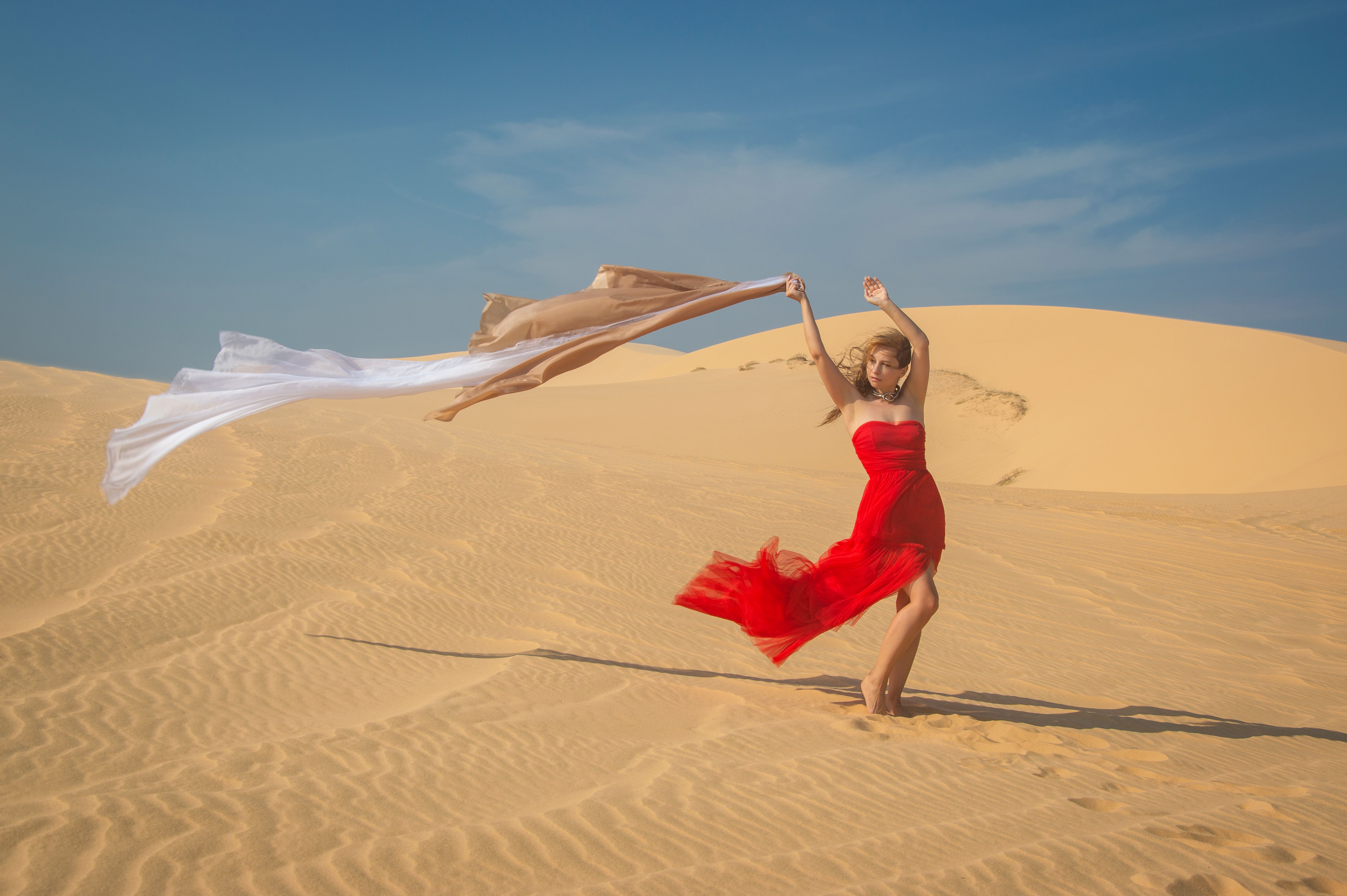 Elegant Woman in Red Dress in Desert · Free Stock Photo