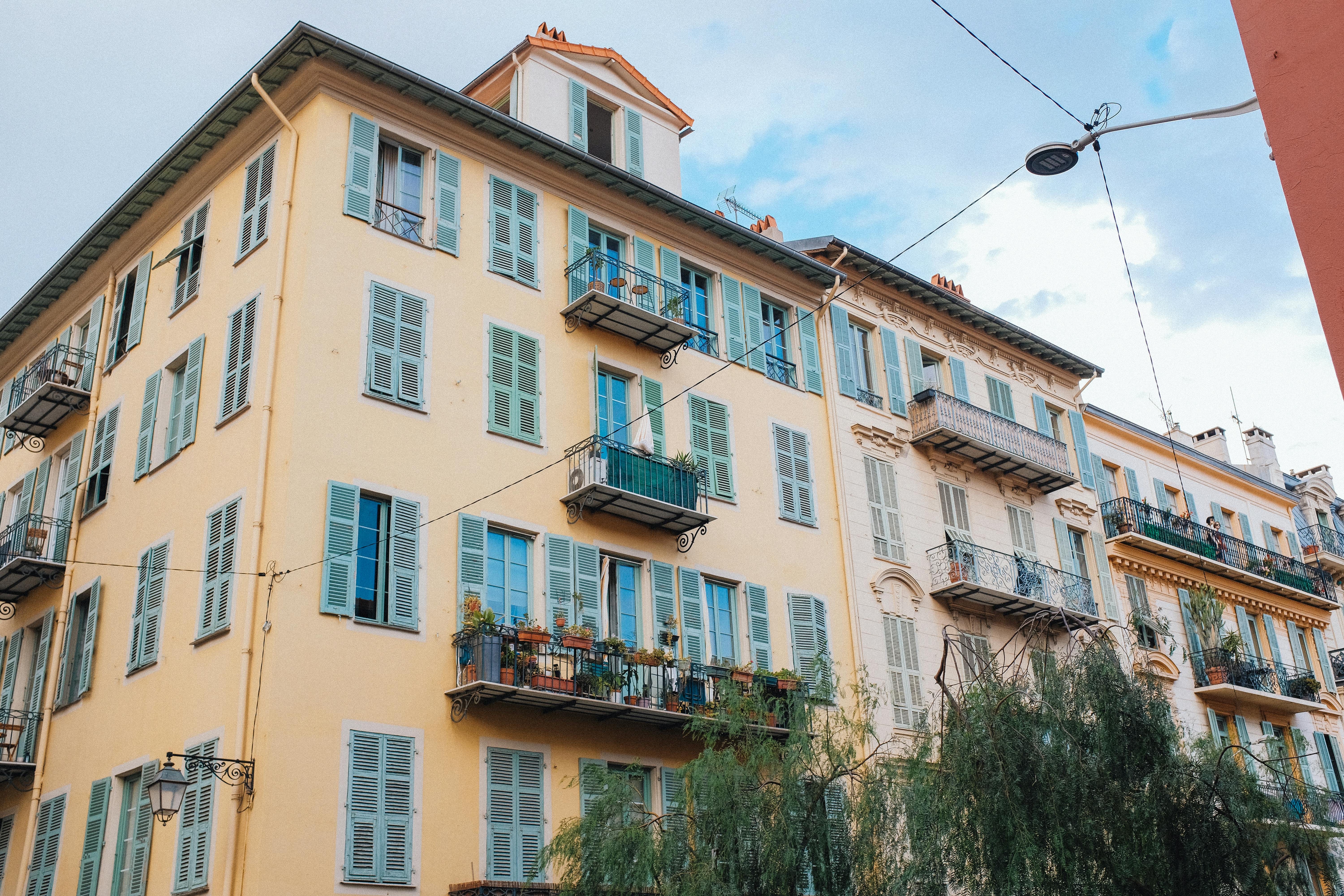Charming European Apartment Building with Balconies · Free Stock Photo