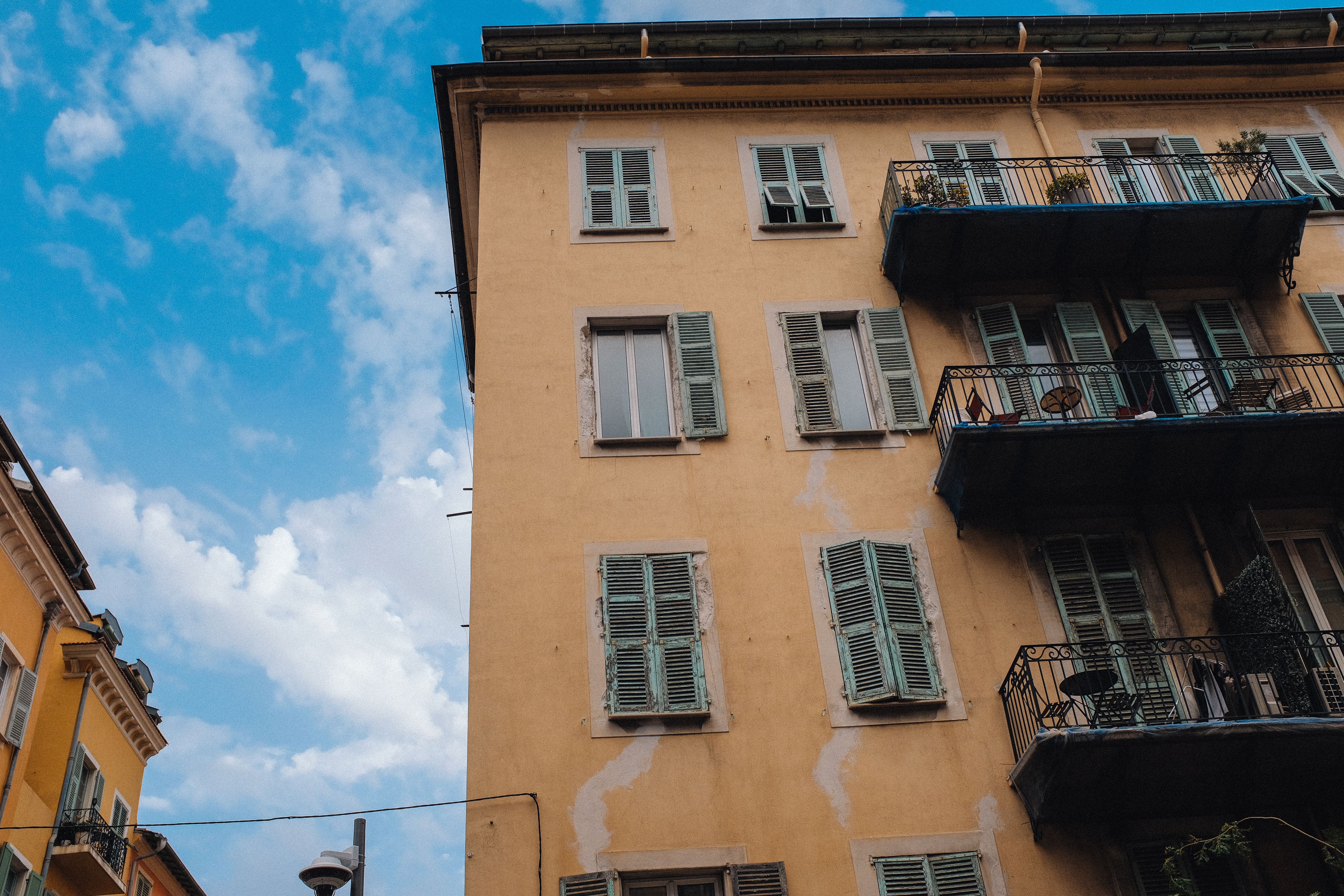 Rustic European Architecture Against Blue Sky · Free Stock Photo