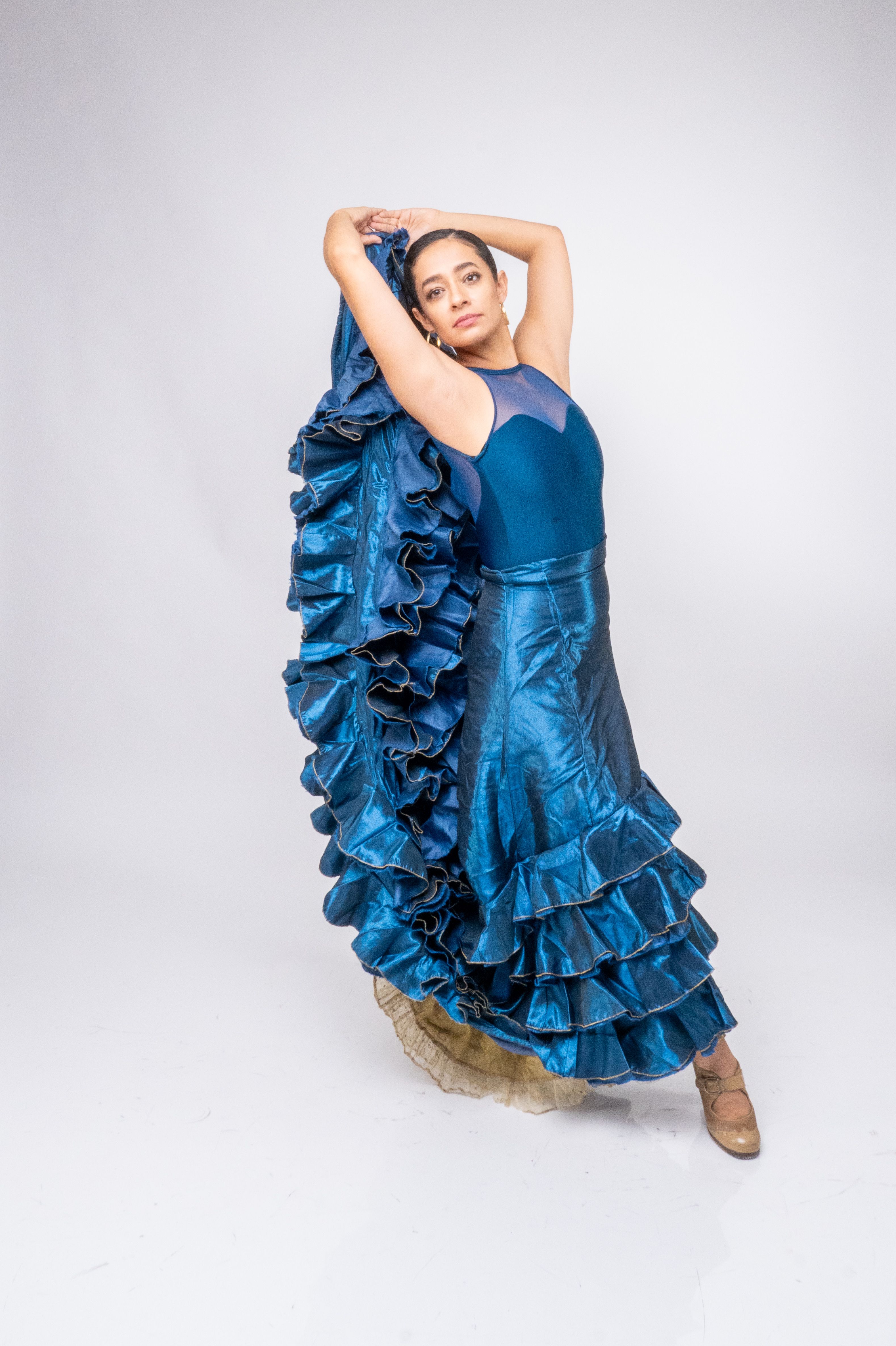Elegant Flamenco Dancer in Blue Dress · Free Stock Photo