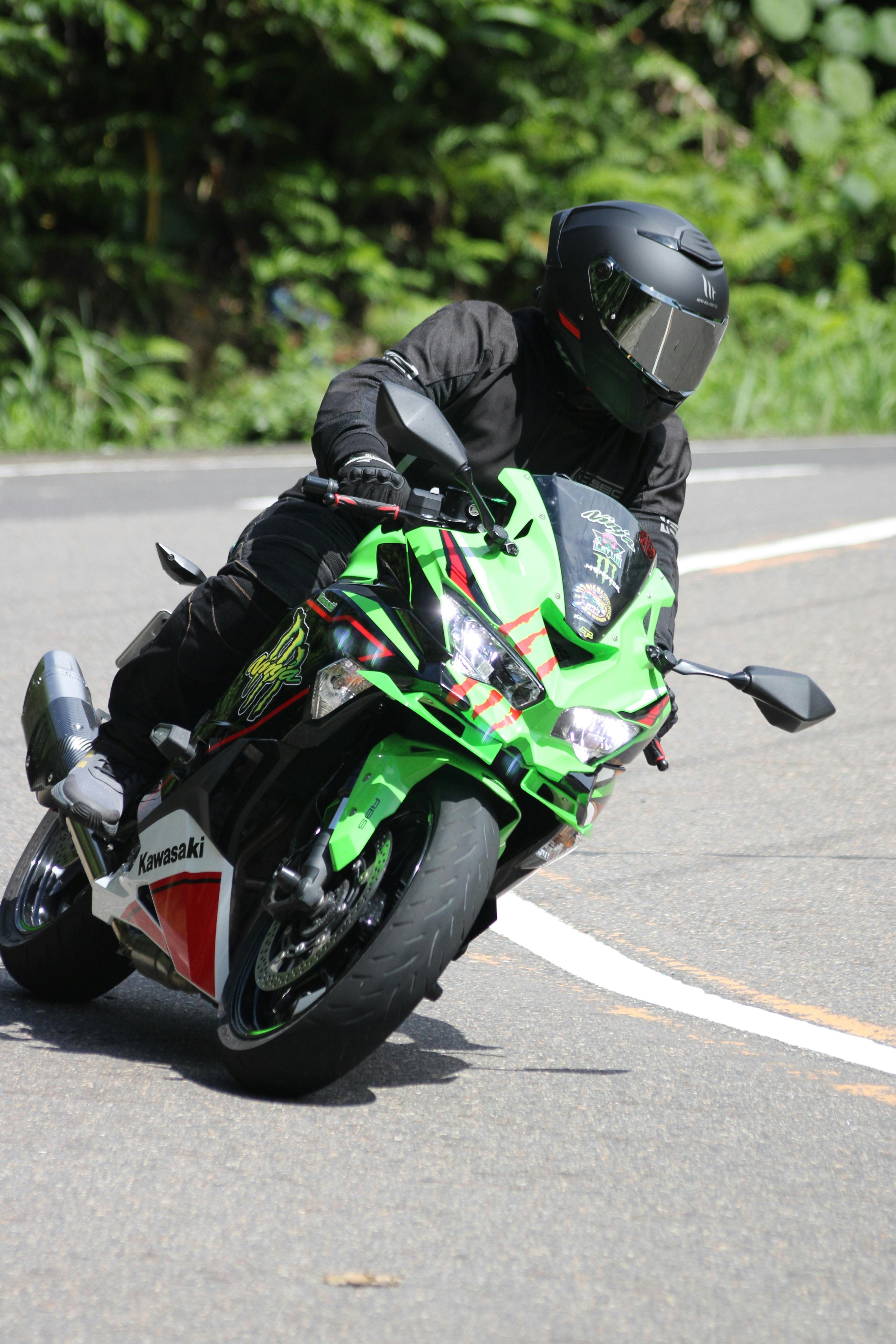 Sport Motorcycle Rider on Curved Road in Bicol · Free Stock Photo