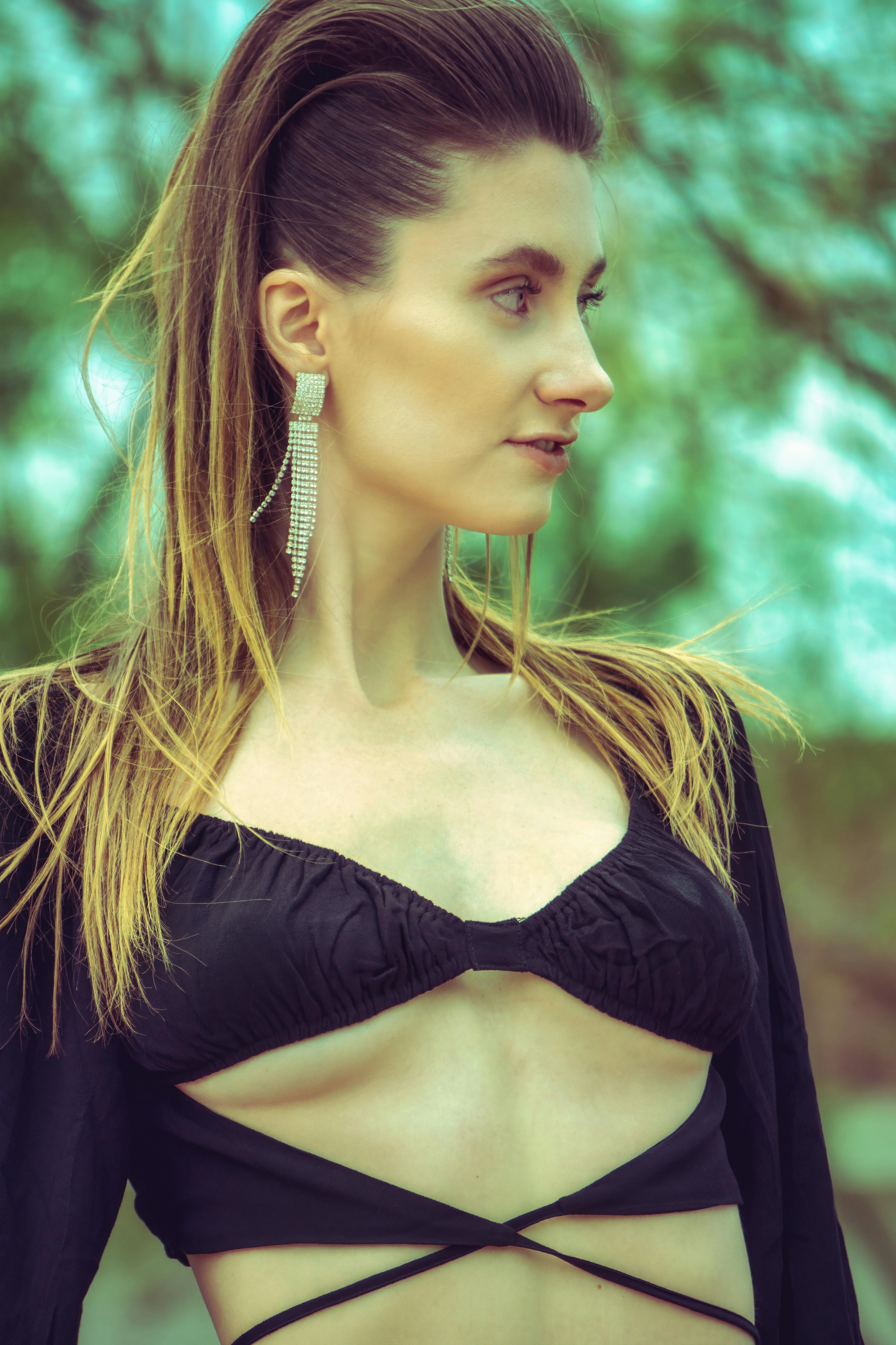 Fashion Model in Outdoor Photoshoot with Tropical Backdrop · Free Stock ...