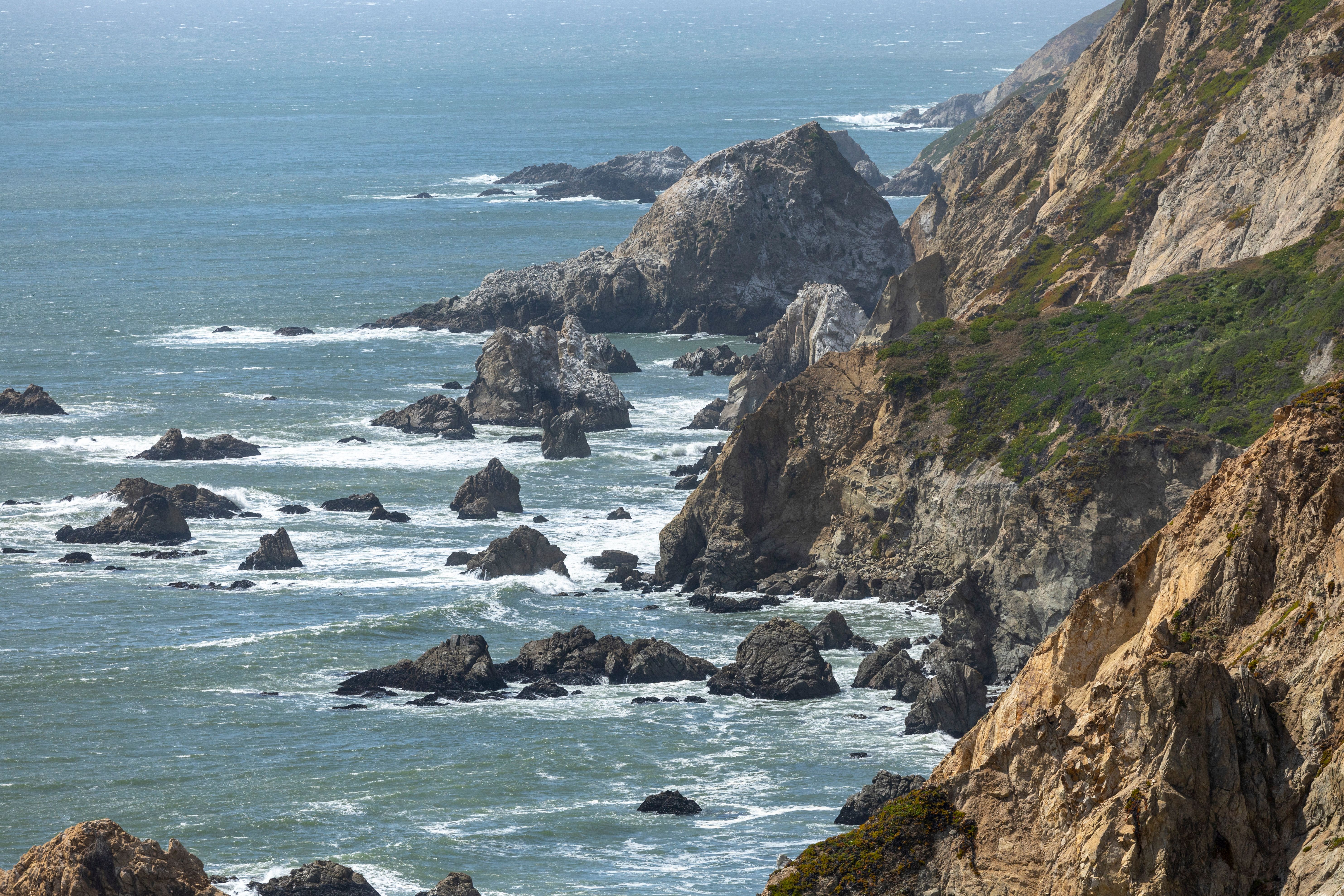 Rocky Coastal Cliffs with Ocean Waves · Free Stock Photo