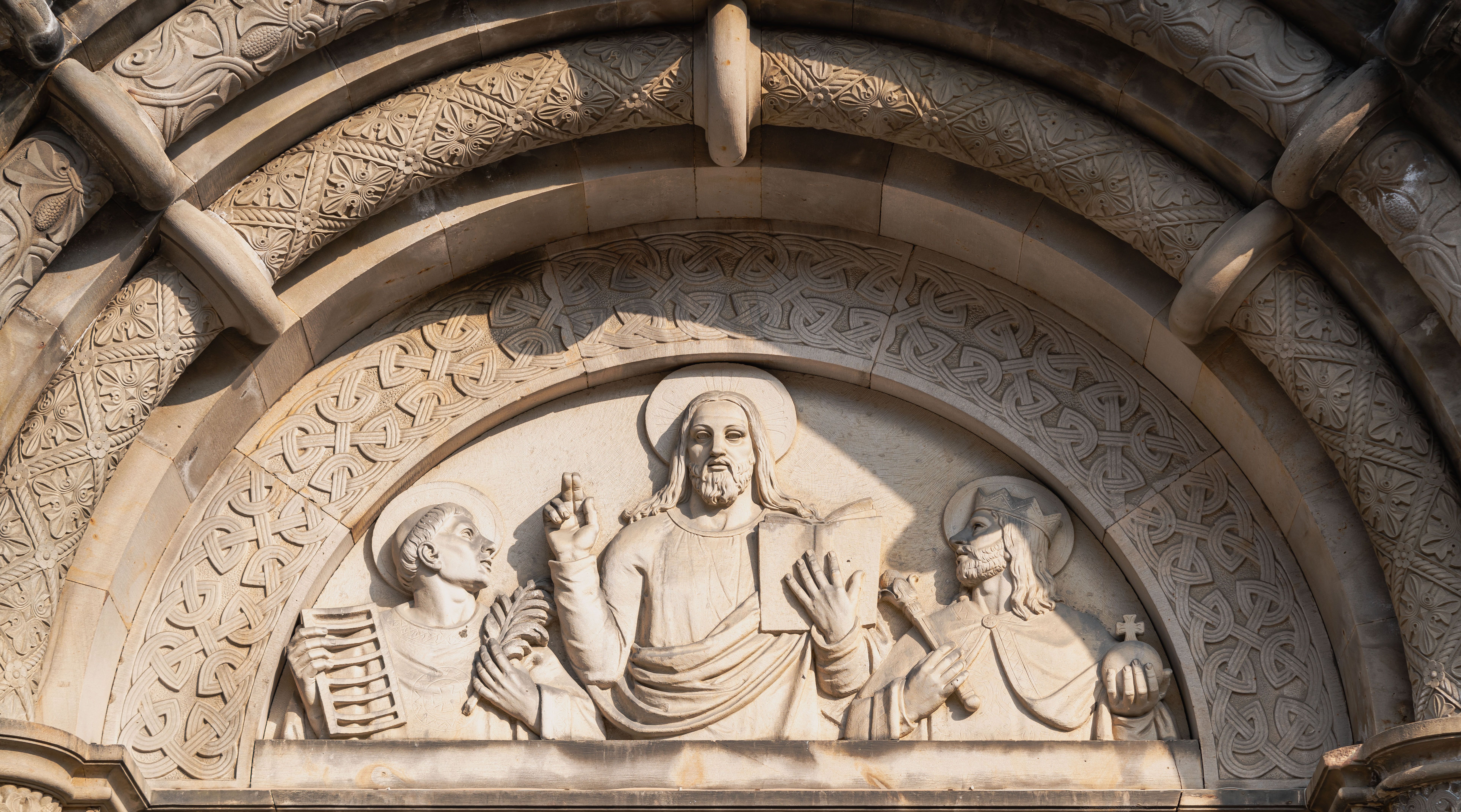 Intricate Religious Stone Carving on Cathedral Façade · Free Stock Photo