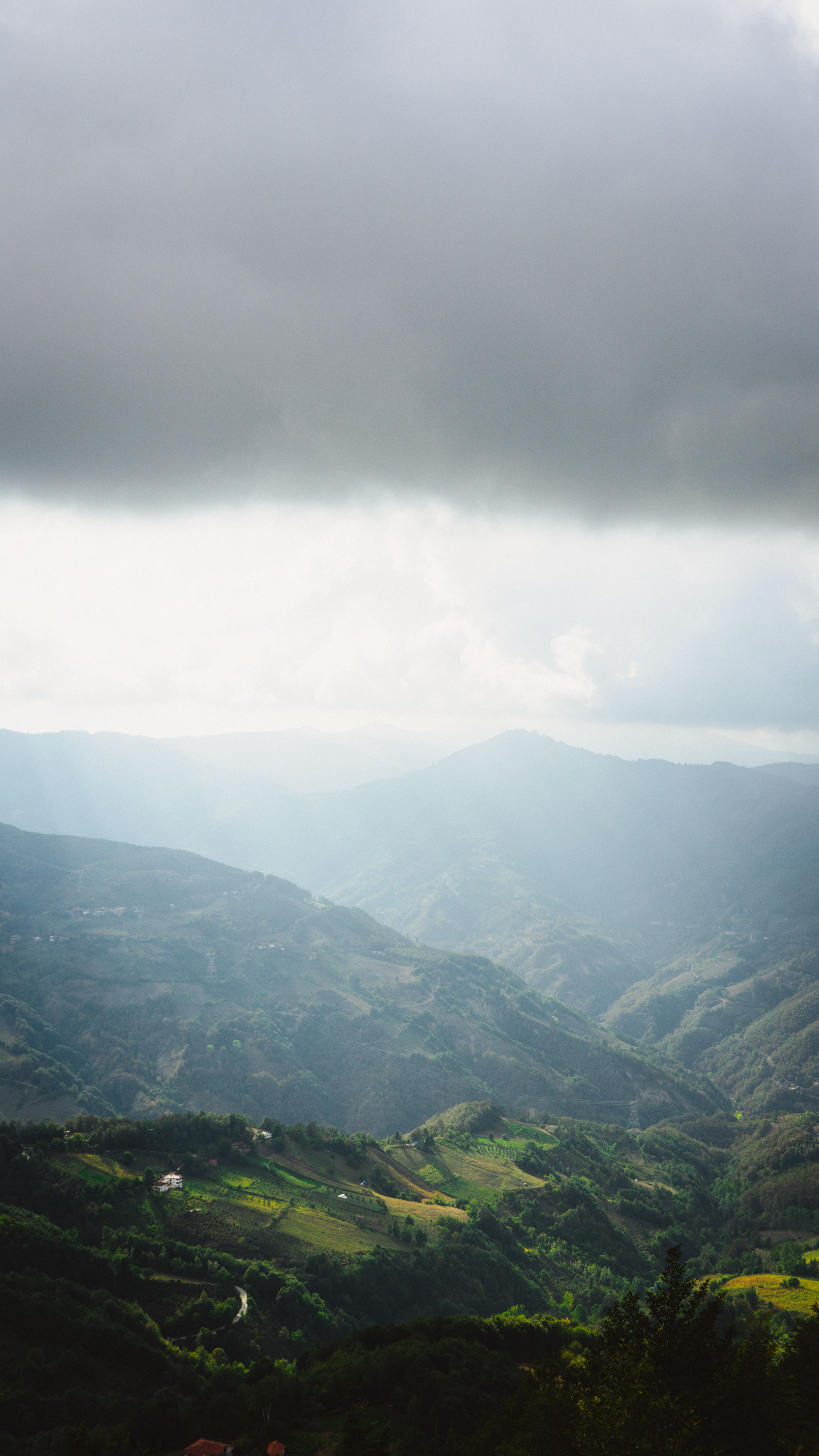Scenic Mountain Valley View Under Cloudy Sky · Free Stock Photo