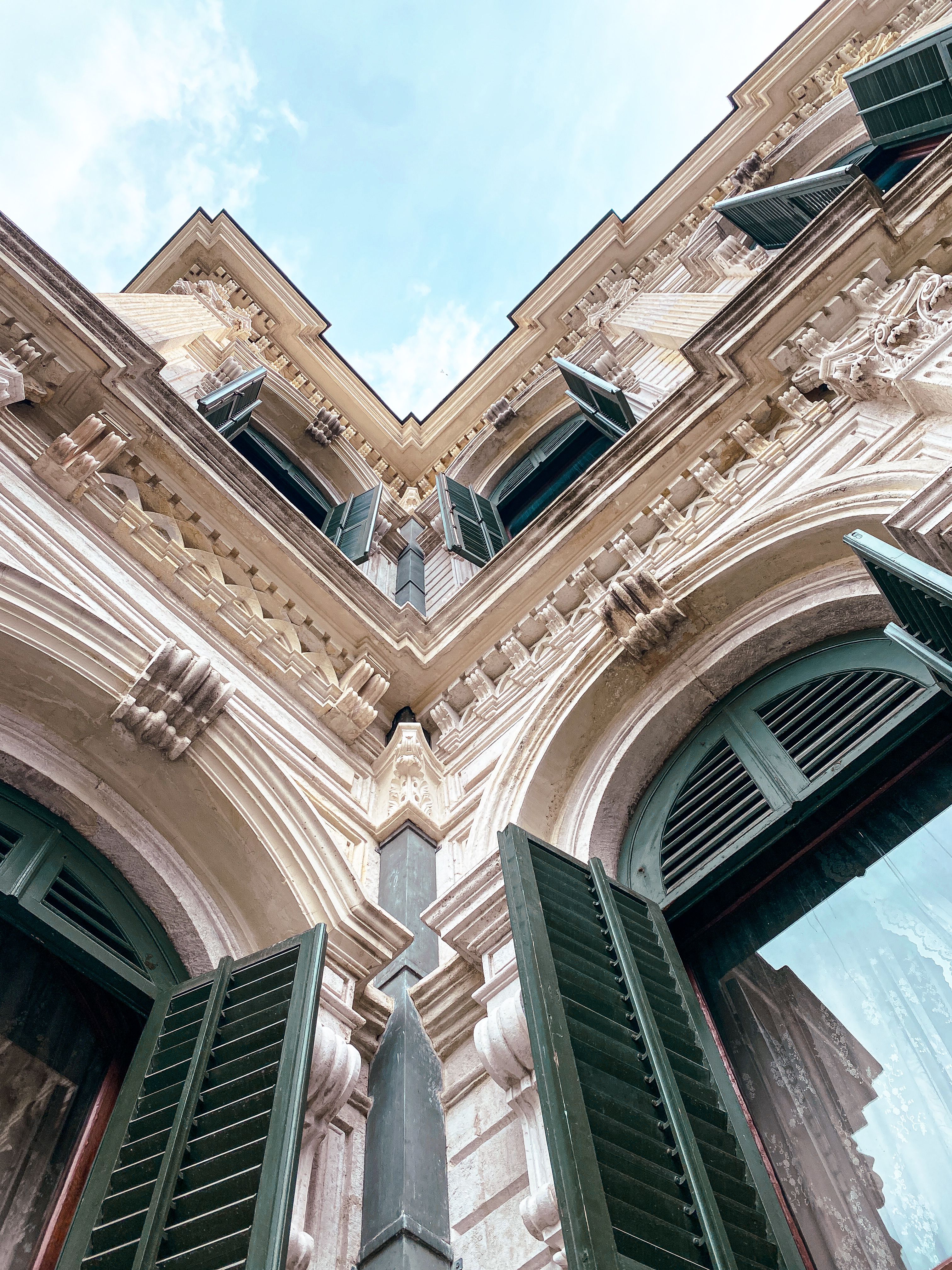 Elegant European Architectural Facade with Arched Windows · Free Stock ...