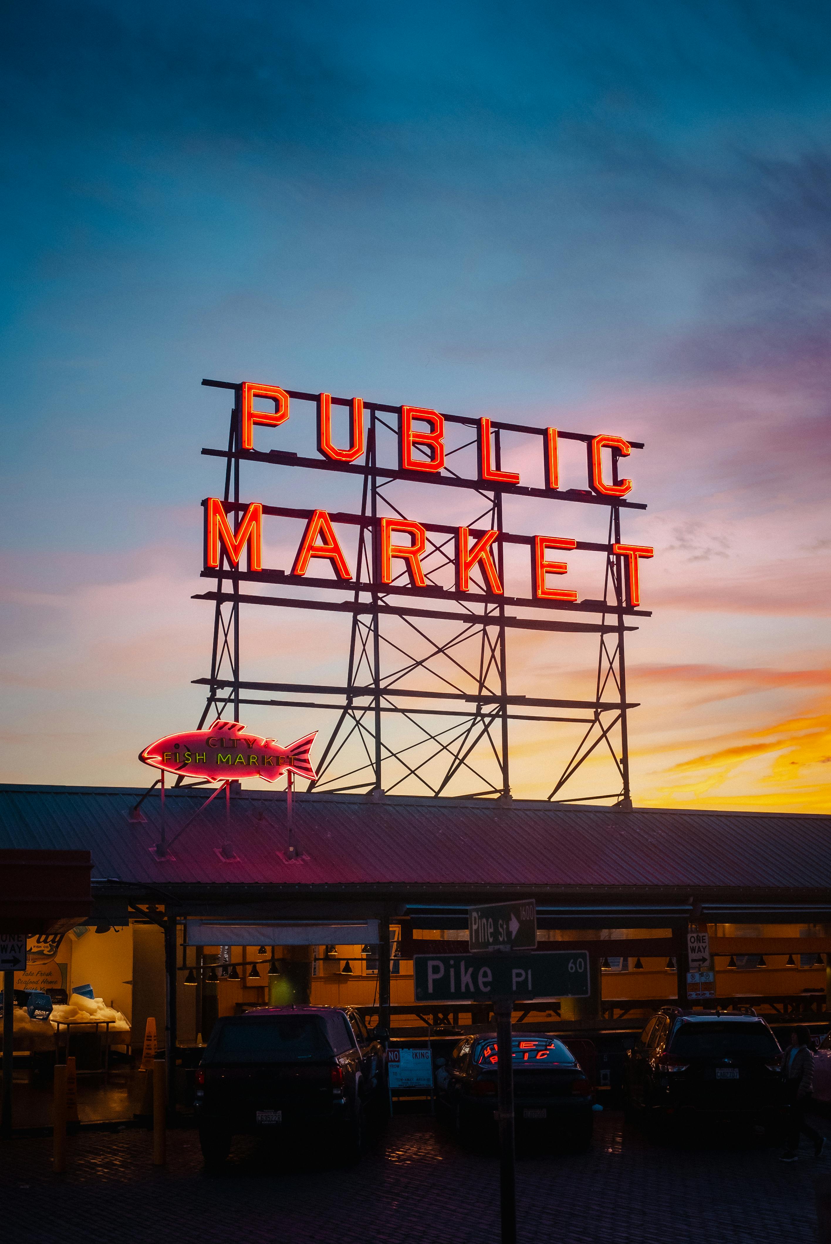 Iconic Pike Place Market Sign at Dusk · Free Stock Photo