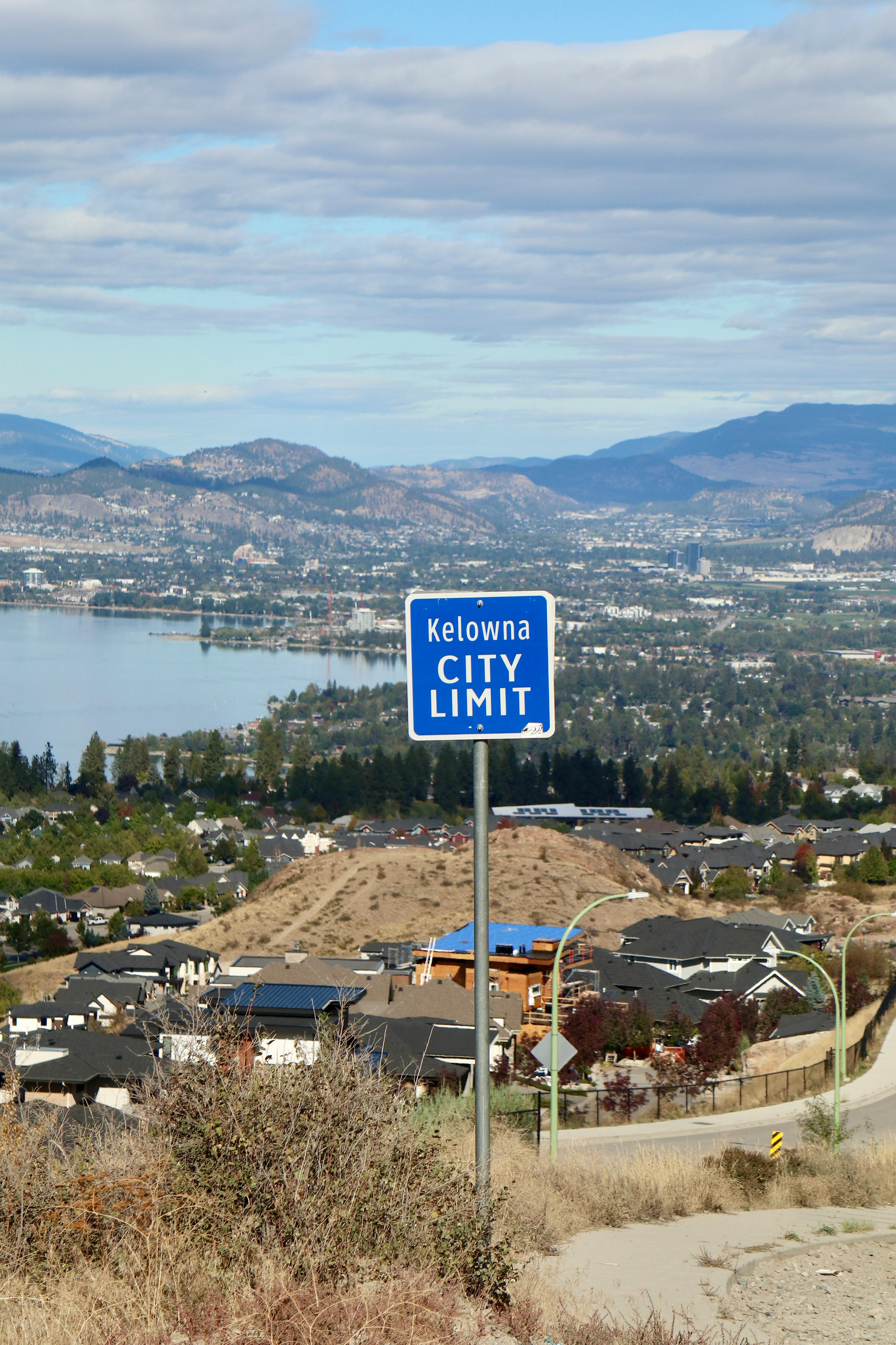 Scenic View of Kelowna City Limit Sign · Free Stock Photo