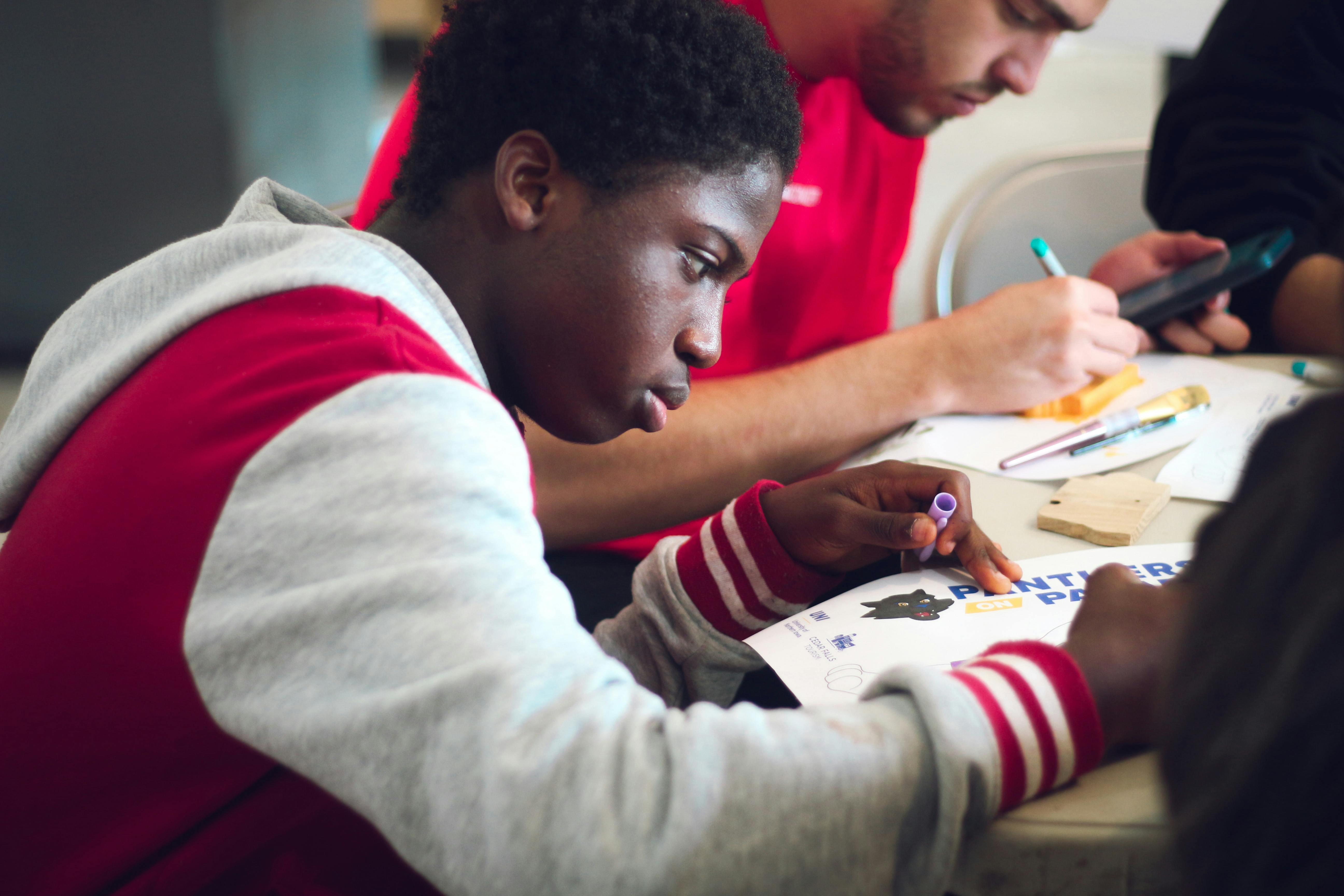 Focused Students Collaborate on Group Project · Free Stock Photo