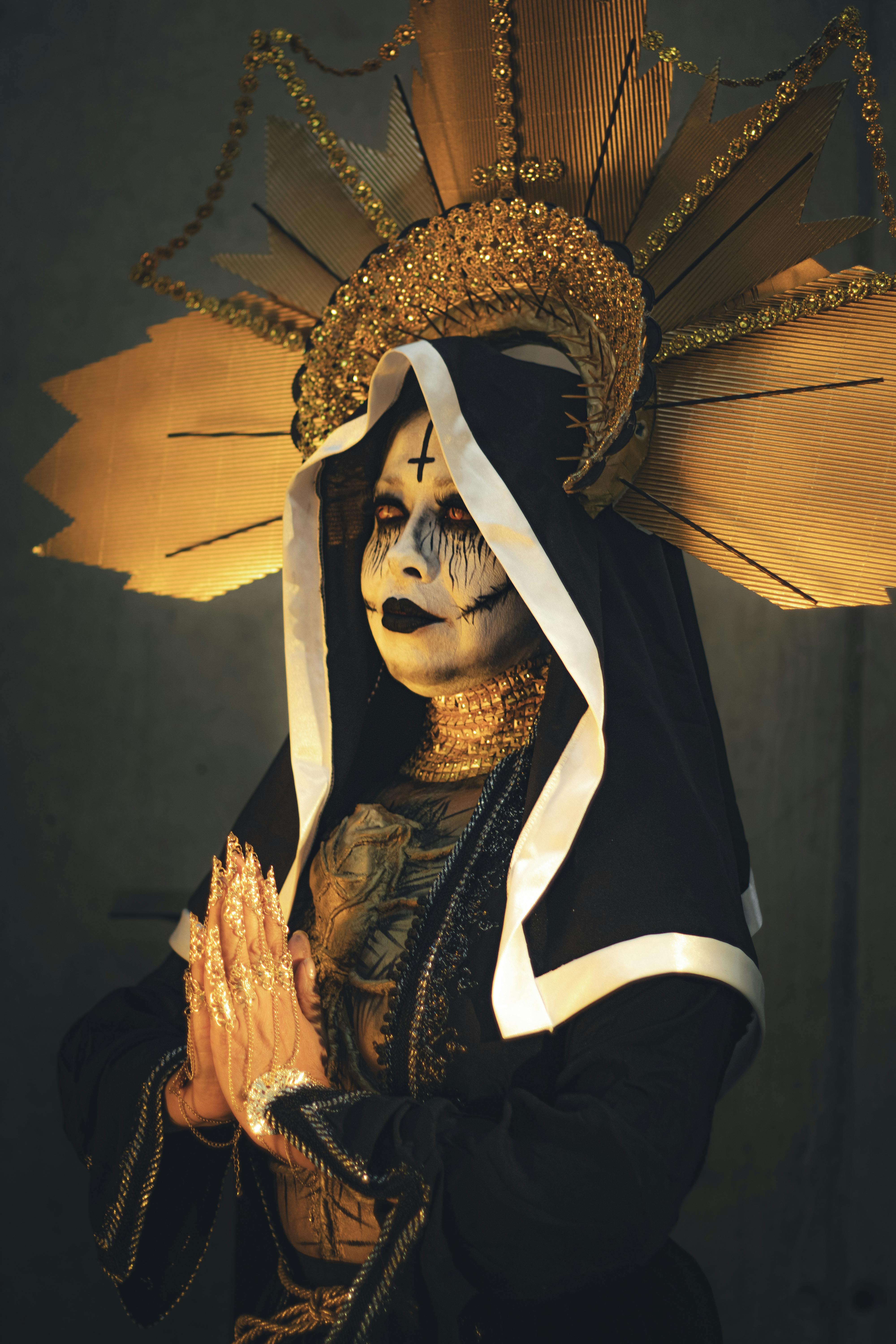 Dramatic Costume Portrait with Face Paint · Free Stock Photo