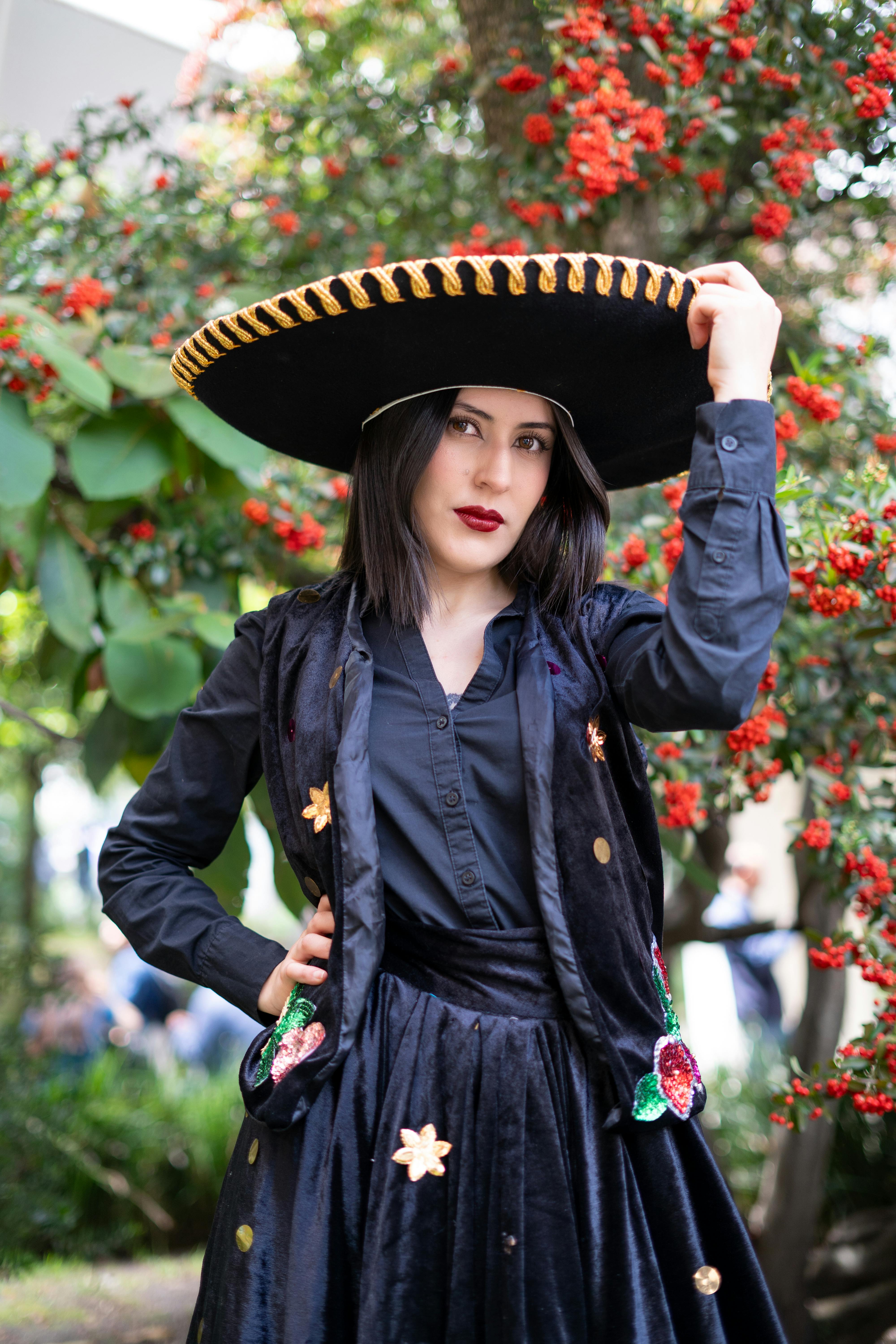 Woman in Traditional Mexican Charro Outfit Outdoors · Free Stock Photo