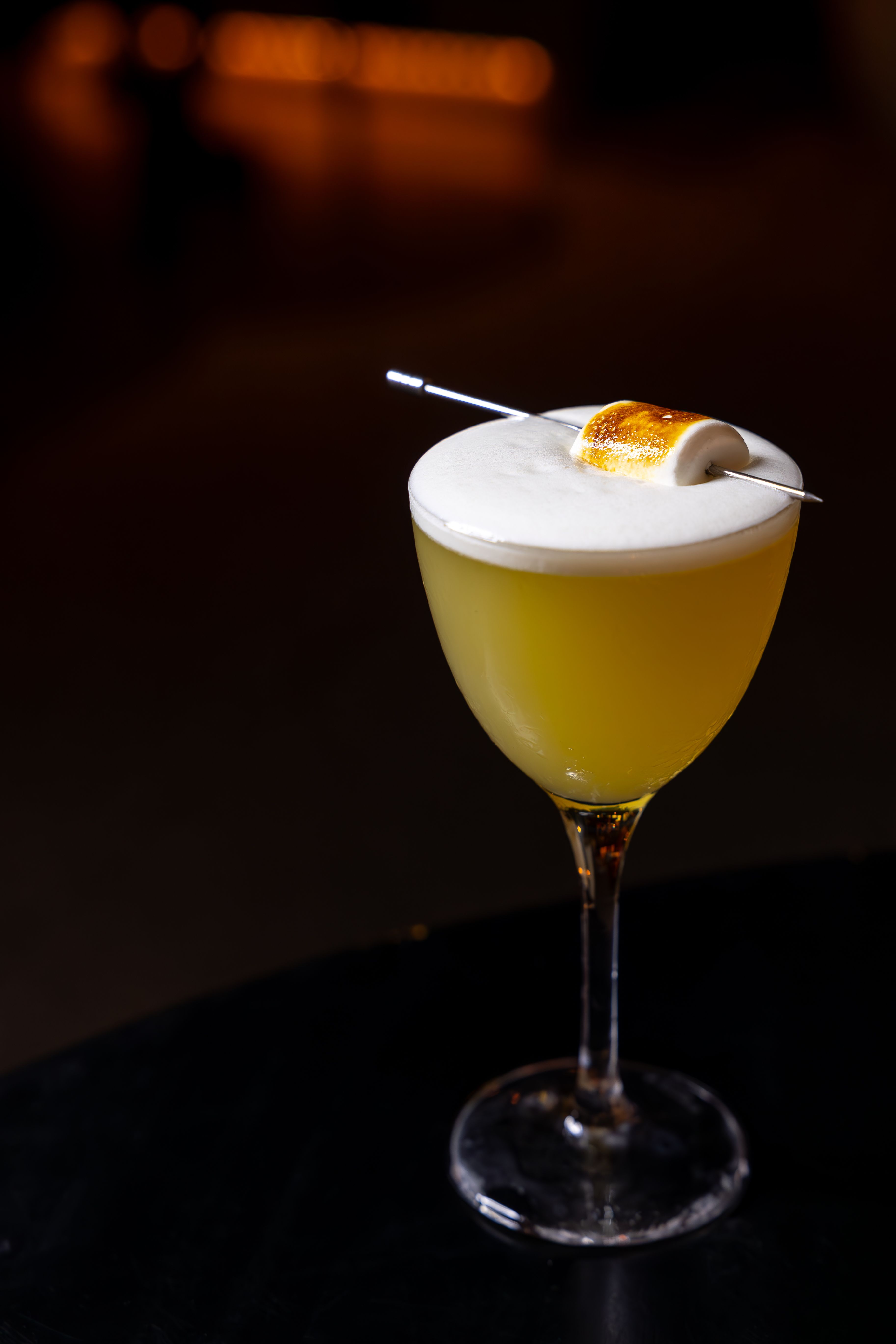 Elegant Cocktail with Toasted Marshmallow Garnish · Free Stock Photo