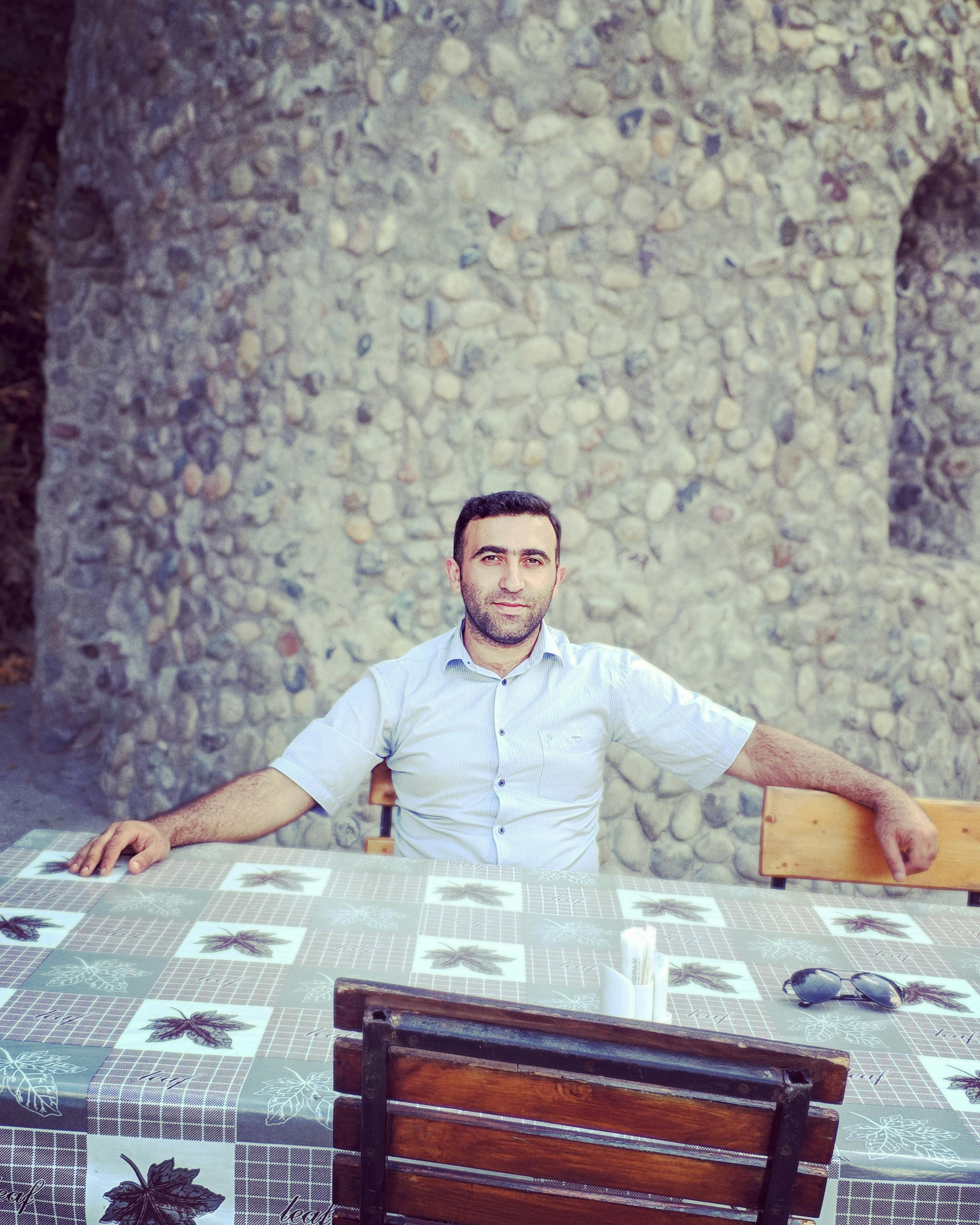 Man Sitting at the Table · Free Stock Photo