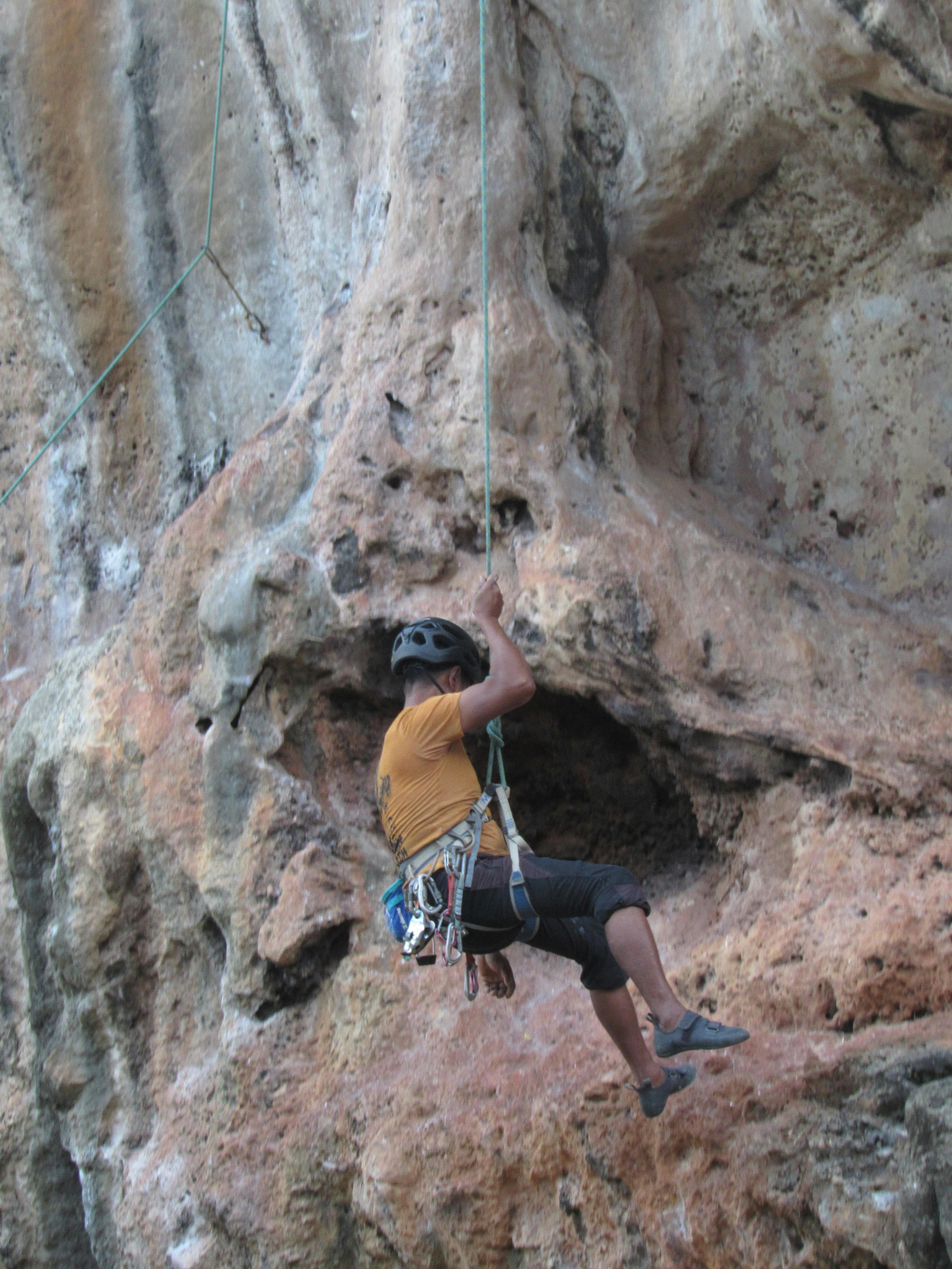 Silhouette of Men Rock Climbing in the Gap between Two Cliffs · Free ...