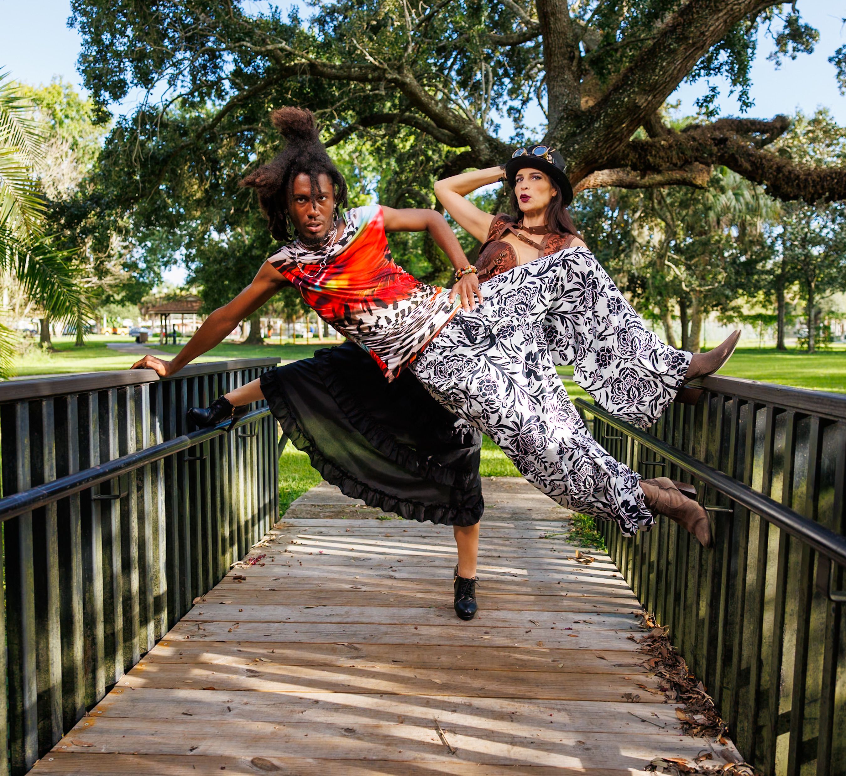 Dynamic Fashion Dance on Rustic Wooden Bridge · Free Stock Photo