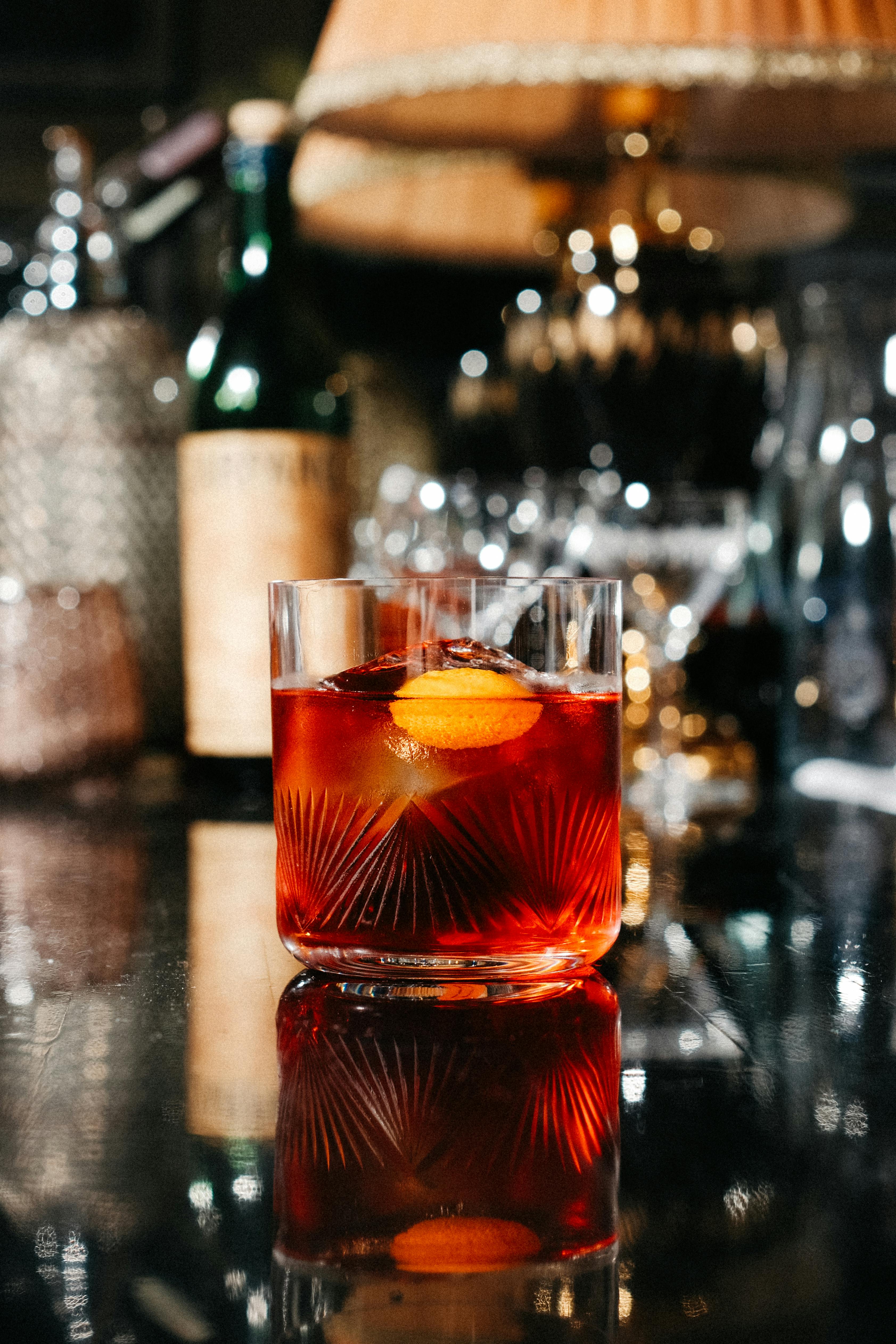 Elegant Negroni Cocktail on Bar Counter · Free Stock Photo