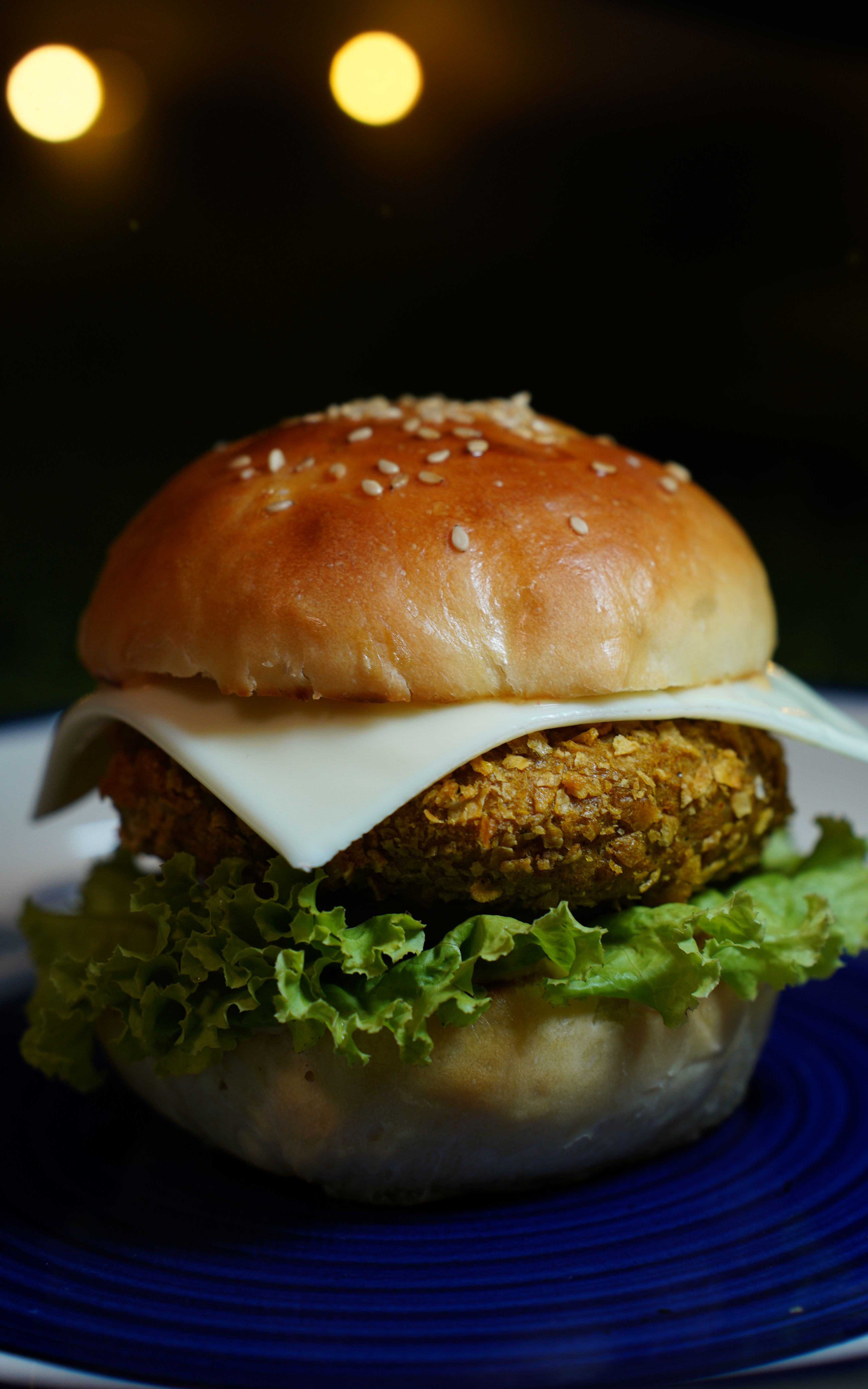 Gourmet Veggie Burger with Cheese and Lettuce · Free Stock Photo