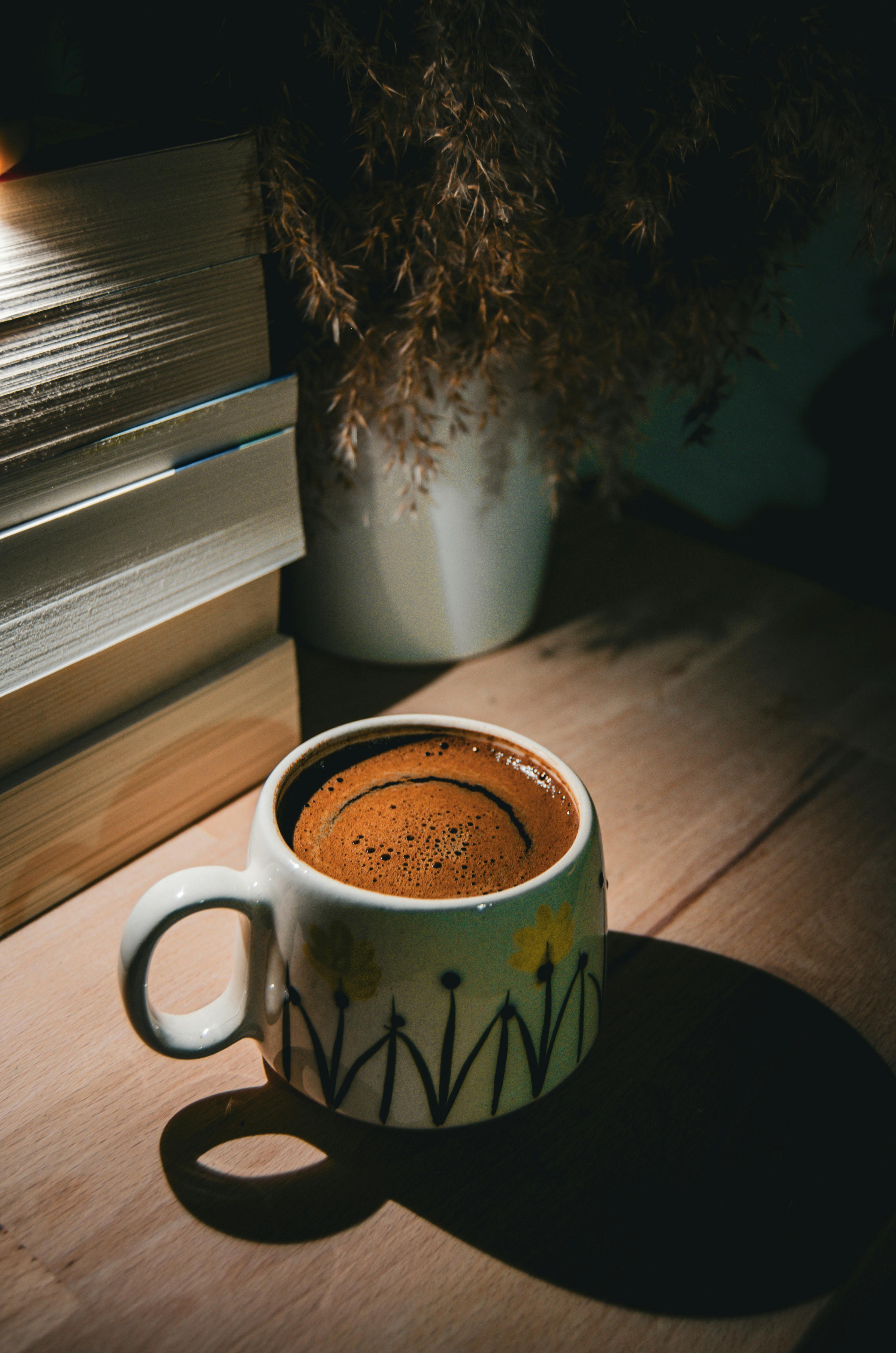 Cozy Evening with a Warm Coffee Mug · Free Stock Photo