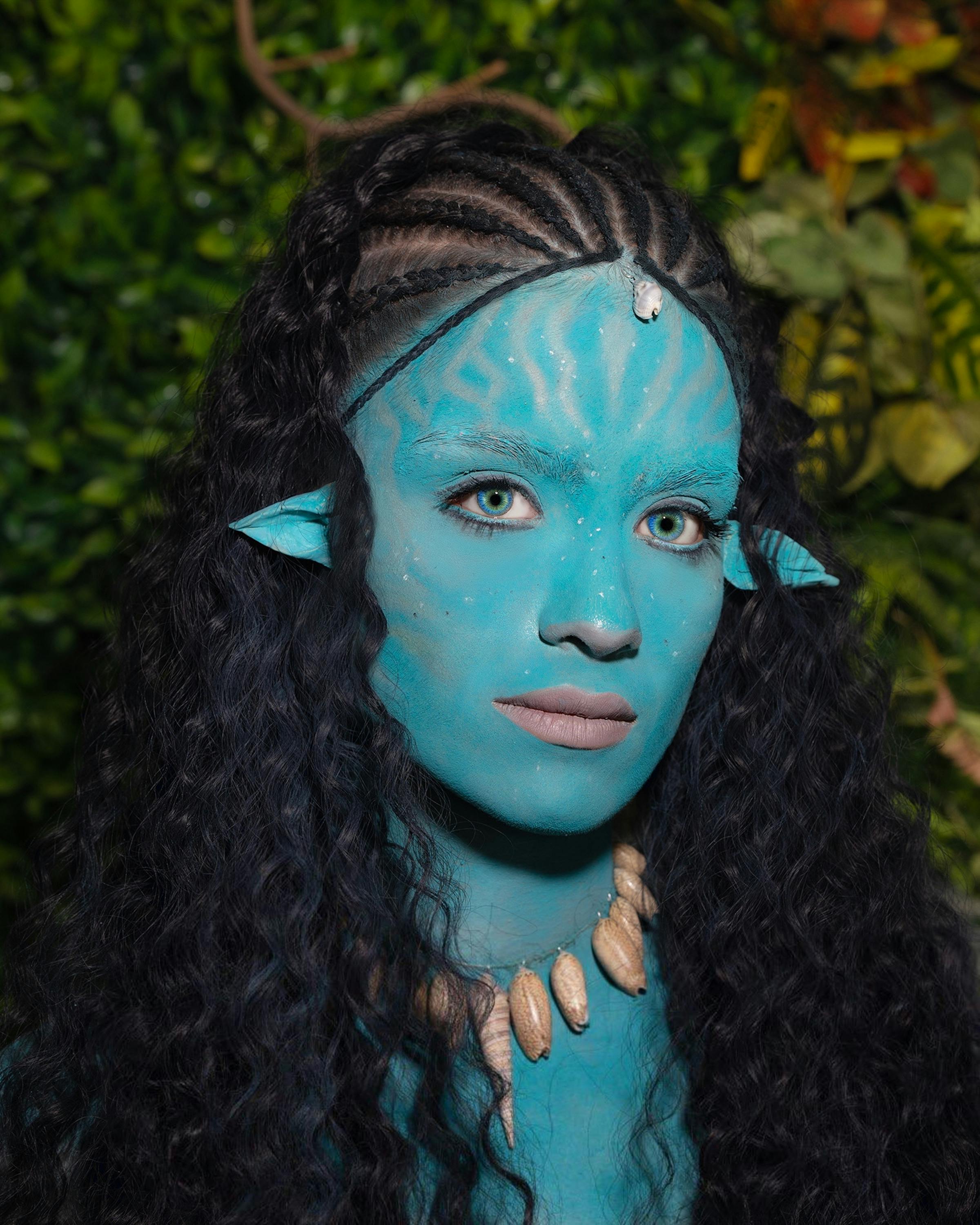 Blue-Skinned Human in Fantasy Costume Portrait · Free Stock Photo