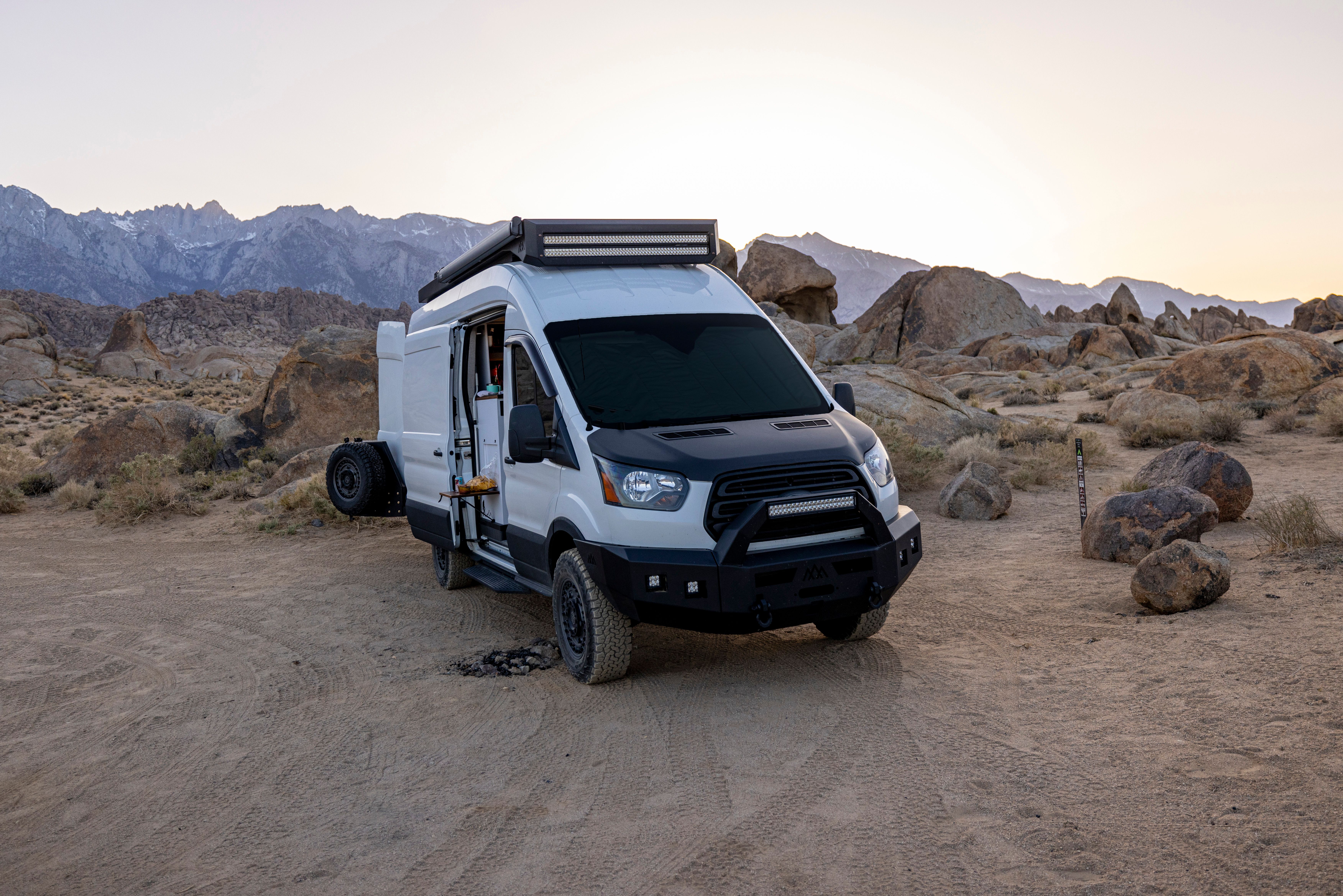 Off-Road Camper Van in Desert Landscape · Free Stock Photo