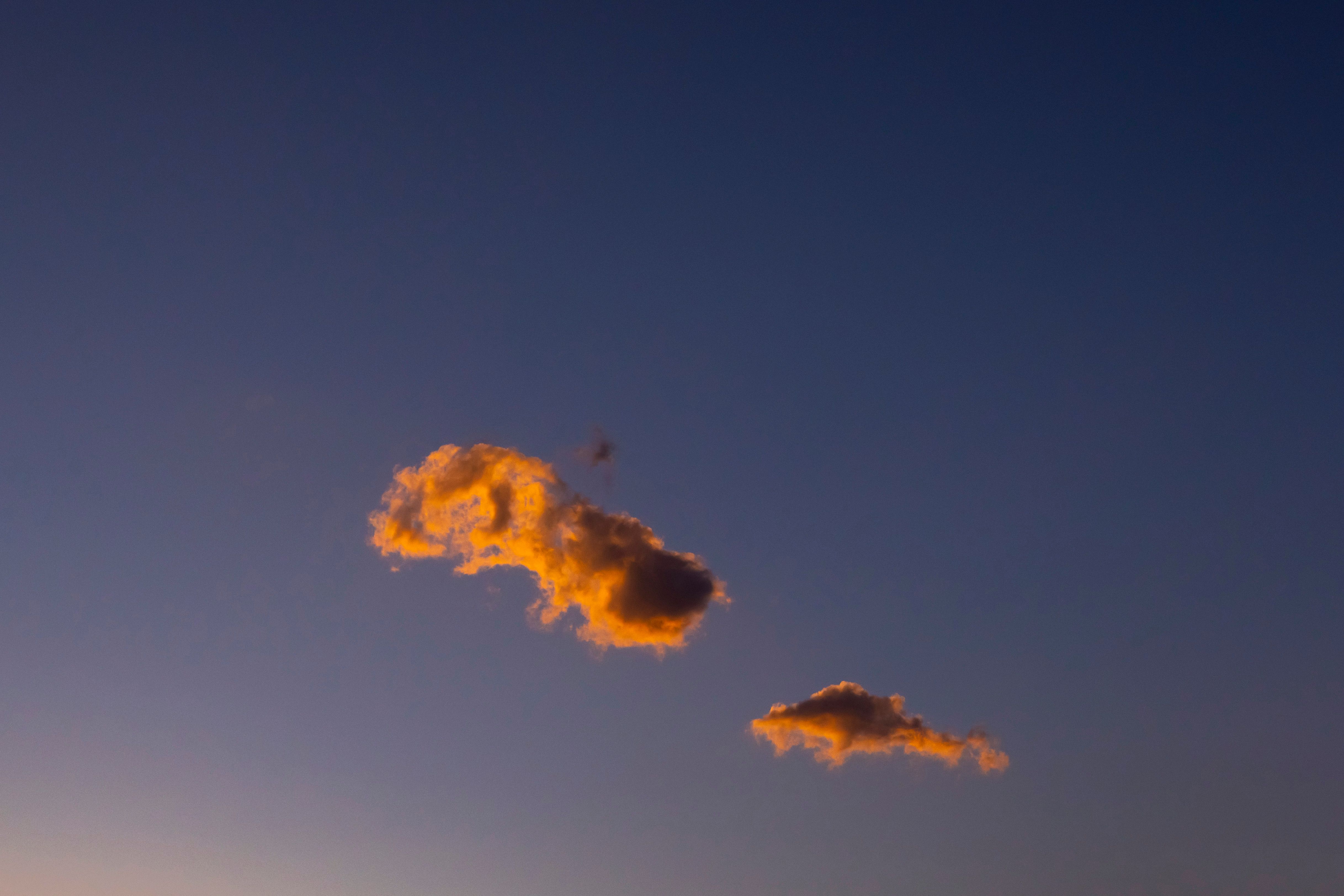 Peaceful Dusk Sky with Illuminated Clouds · Free Stock Photo