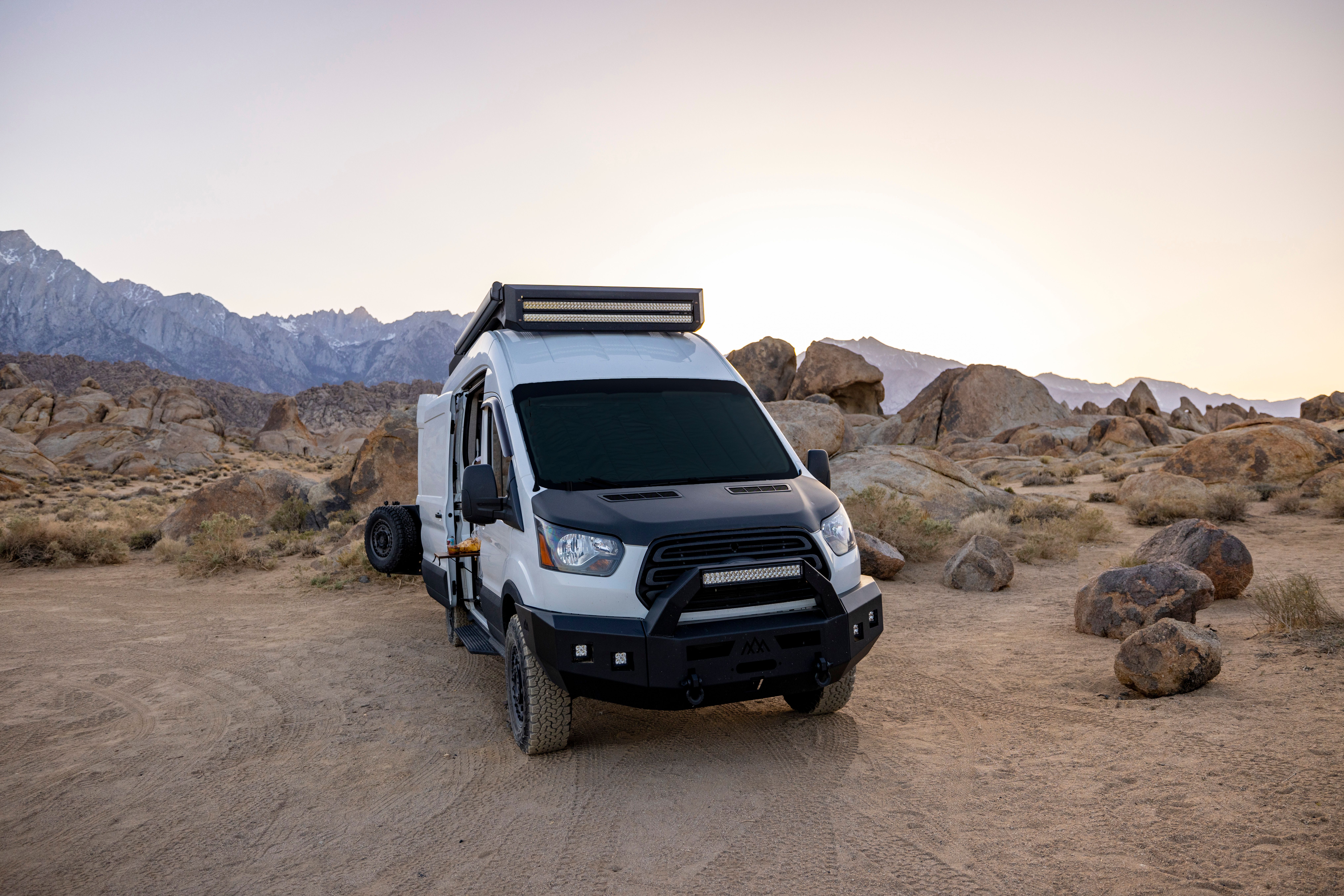 Off-road Camper Van in Rocky Desert Landscape · Free Stock Photo