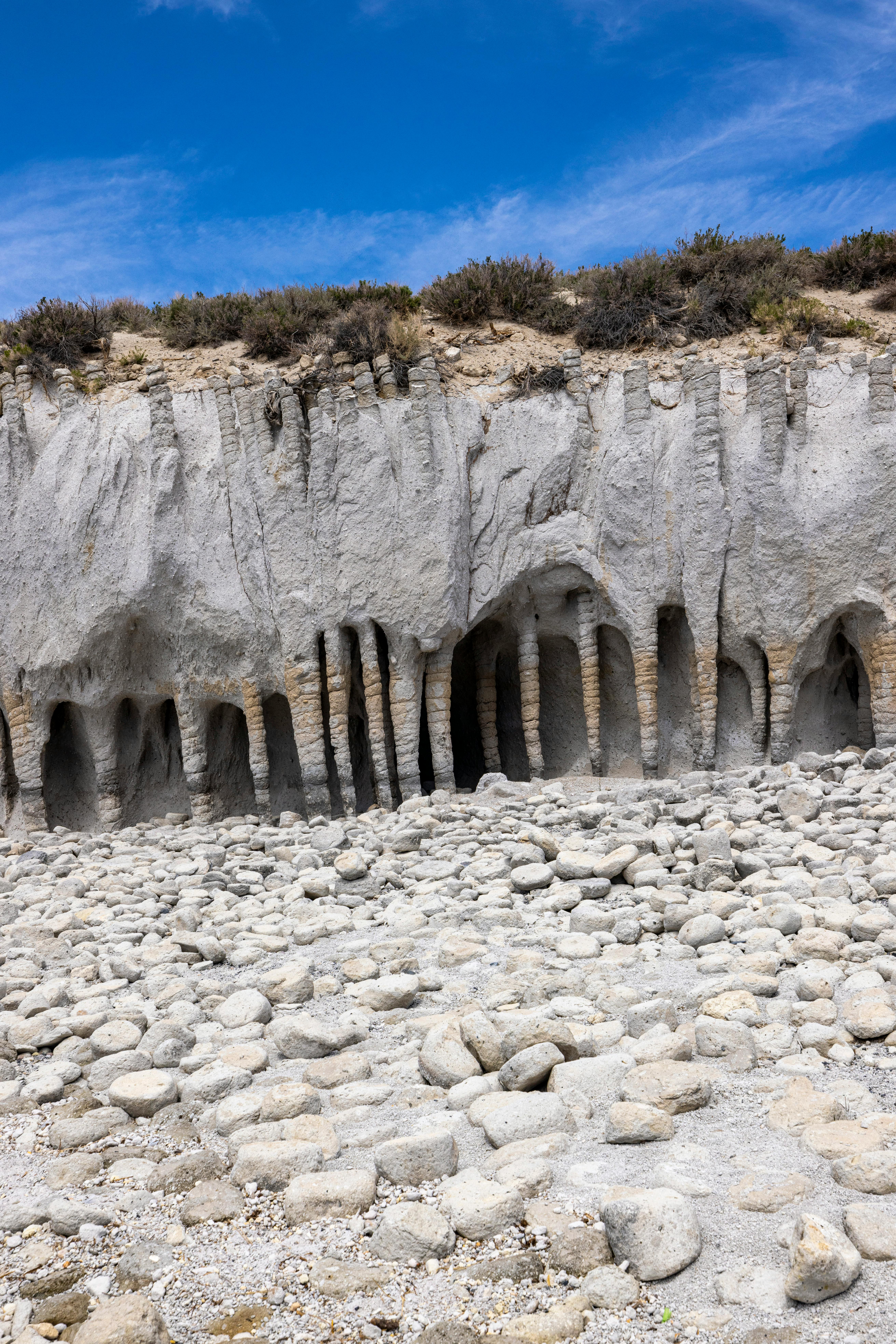 Natural Eroded Cliffs with Unique Cave Formations · Free Stock Photo