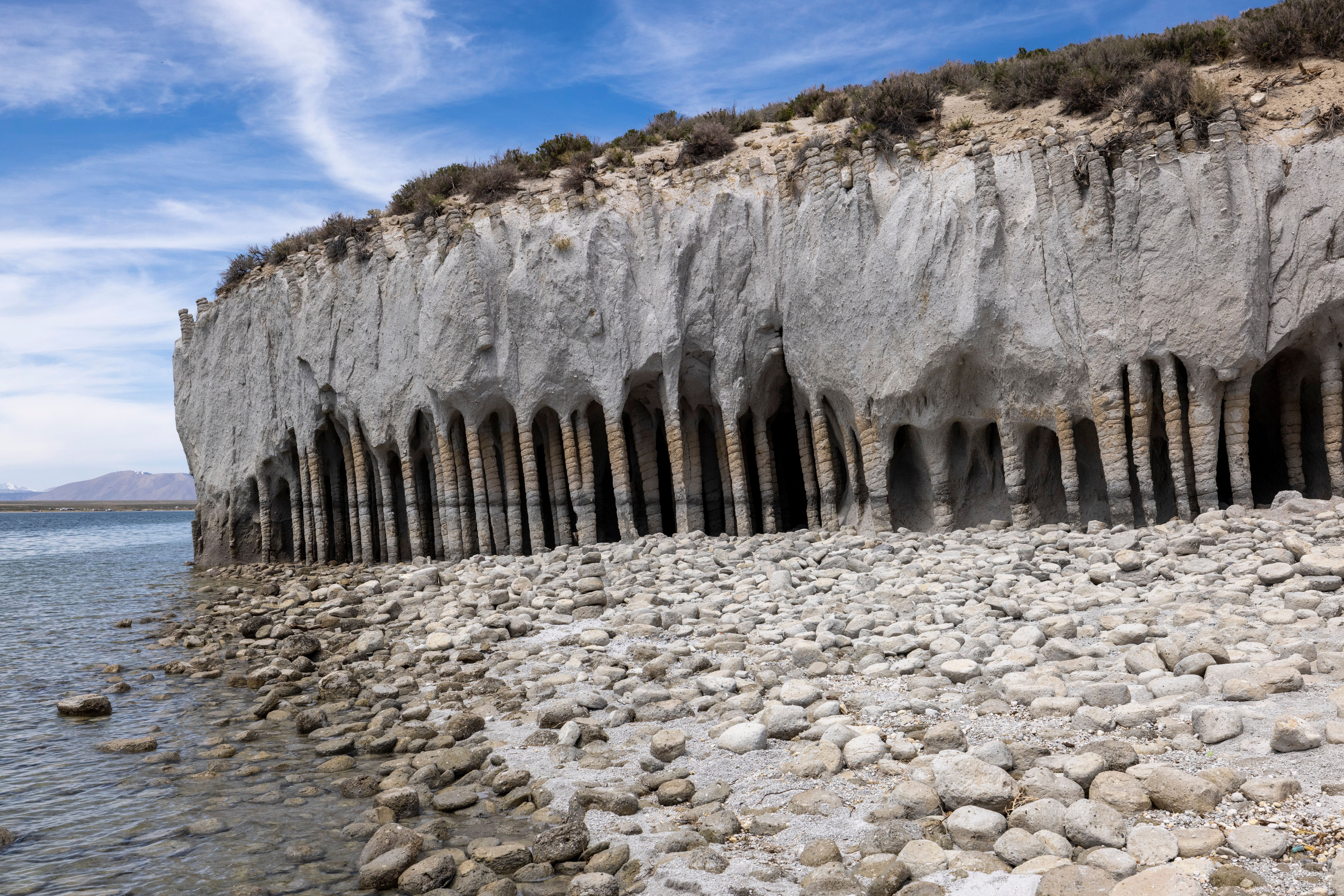 Unique Geographical Columns Along Rugged Cliffside · Free Stock Photo