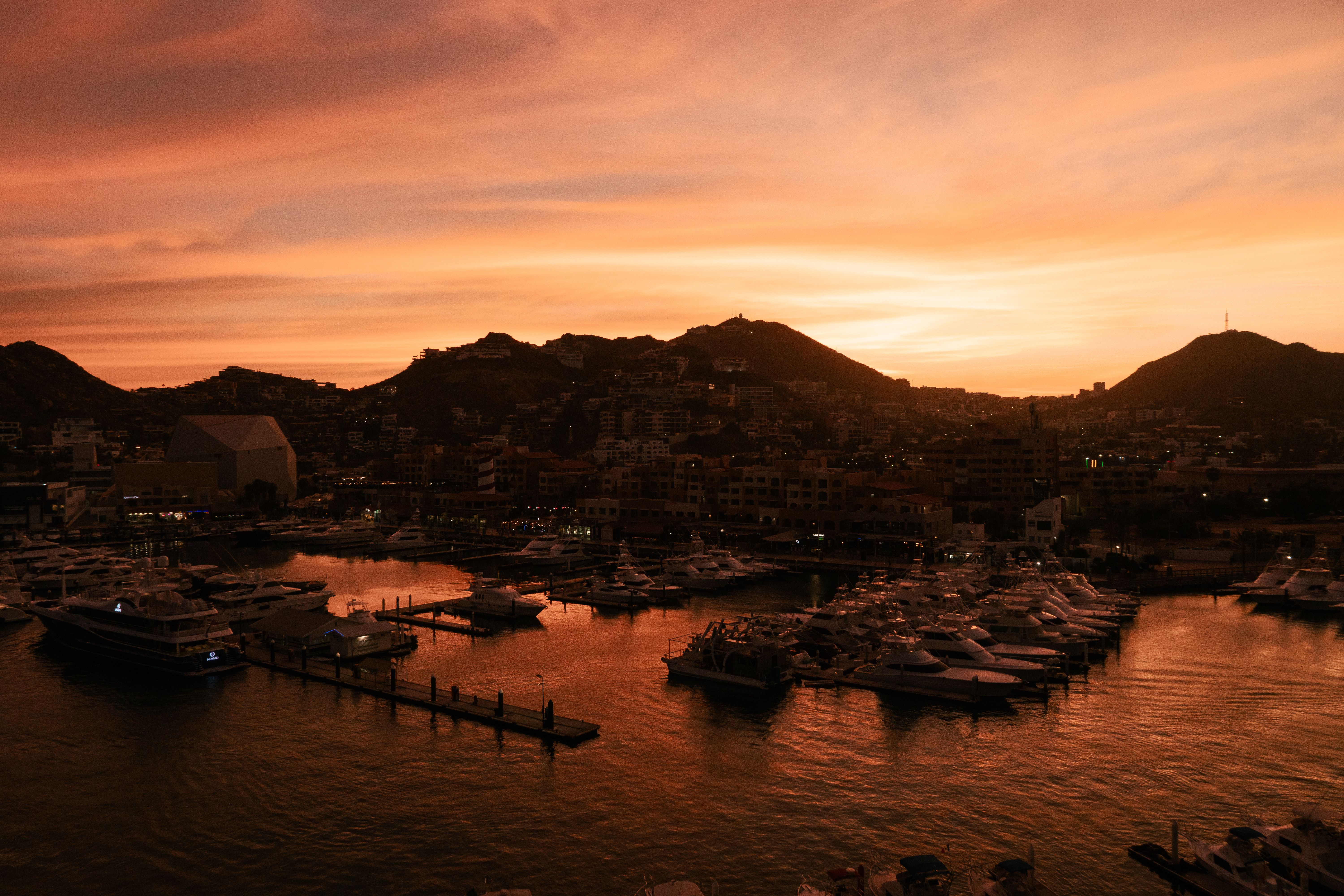 Stunning Harbor Sunset Over Marina with Boats · Free Stock Photo