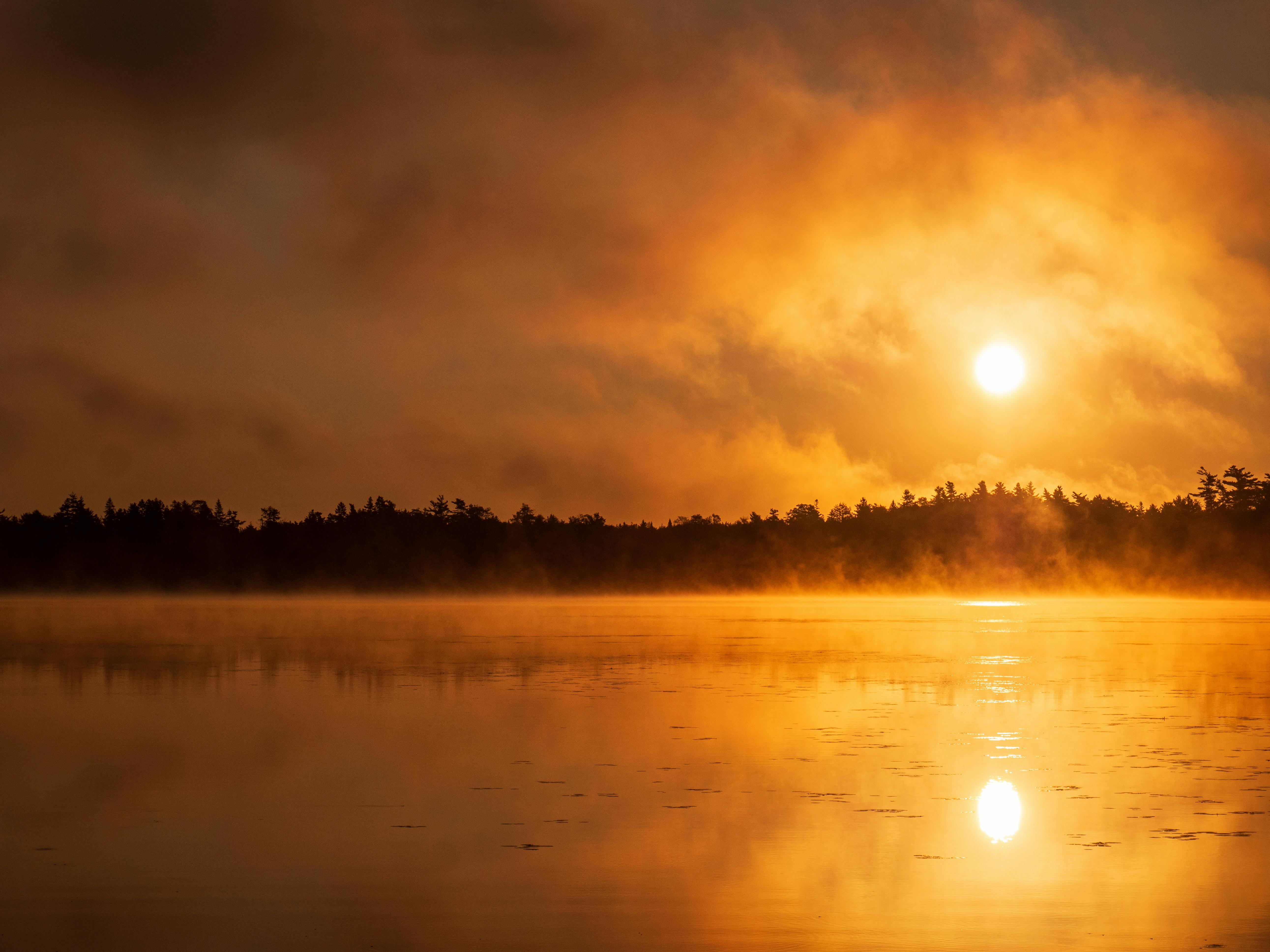 Breathtaking Sunrise Over Calm Reflective Lake · Free Stock Photo
