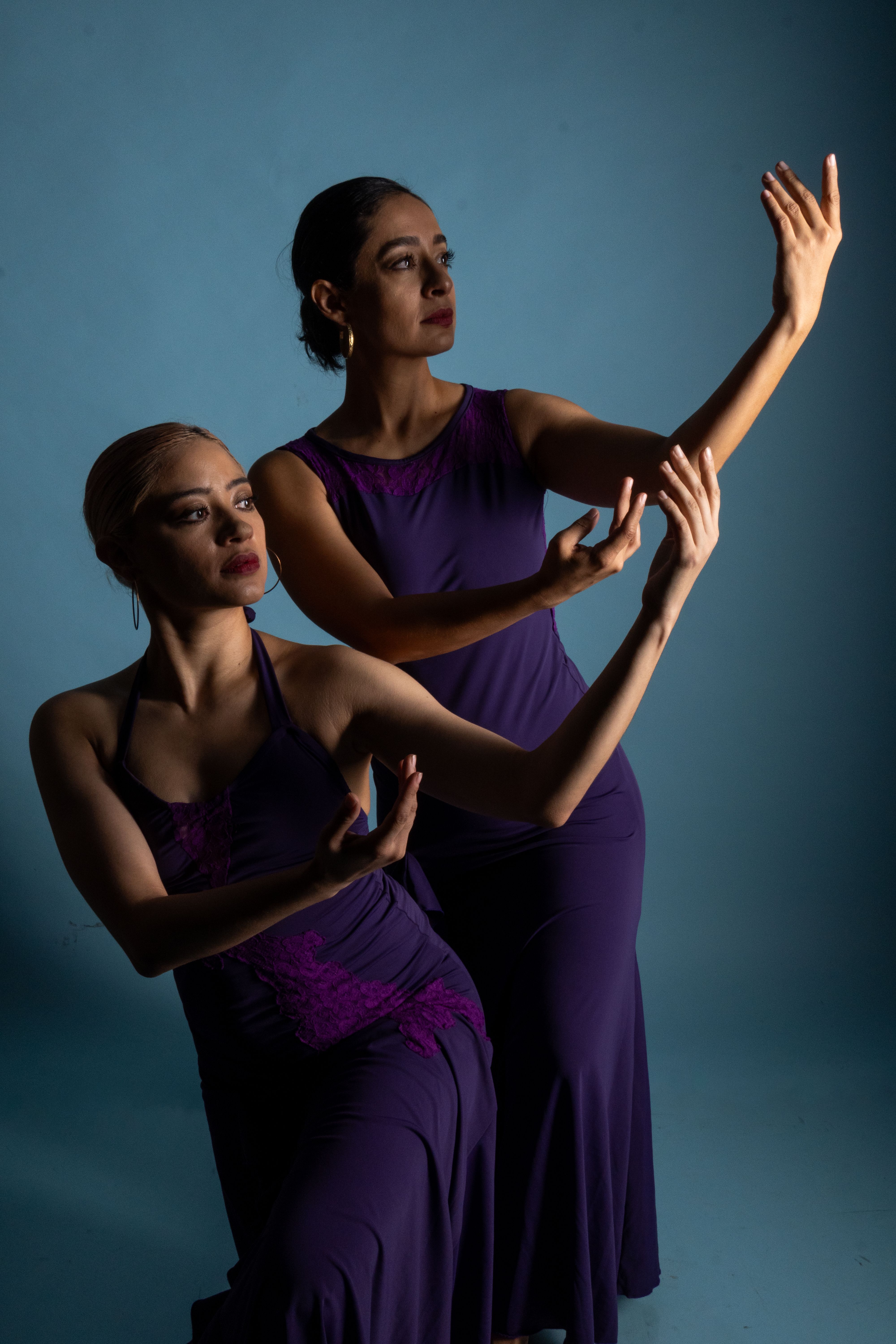 Elegant Female Dancers in Purple Dresses · Free Stock Photo