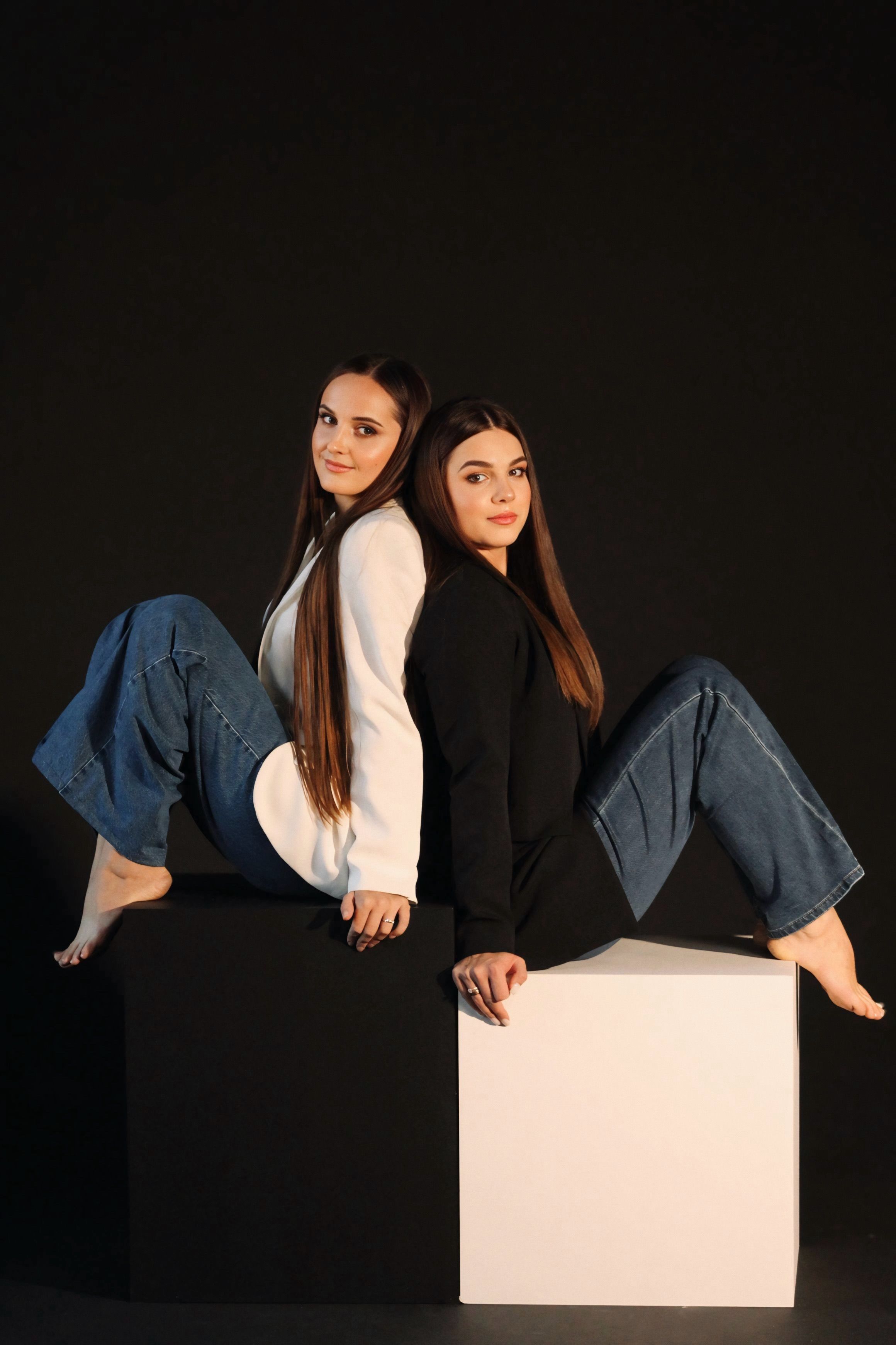 Fashionable Women Posing Artfully in Studio · Free Stock Photo
