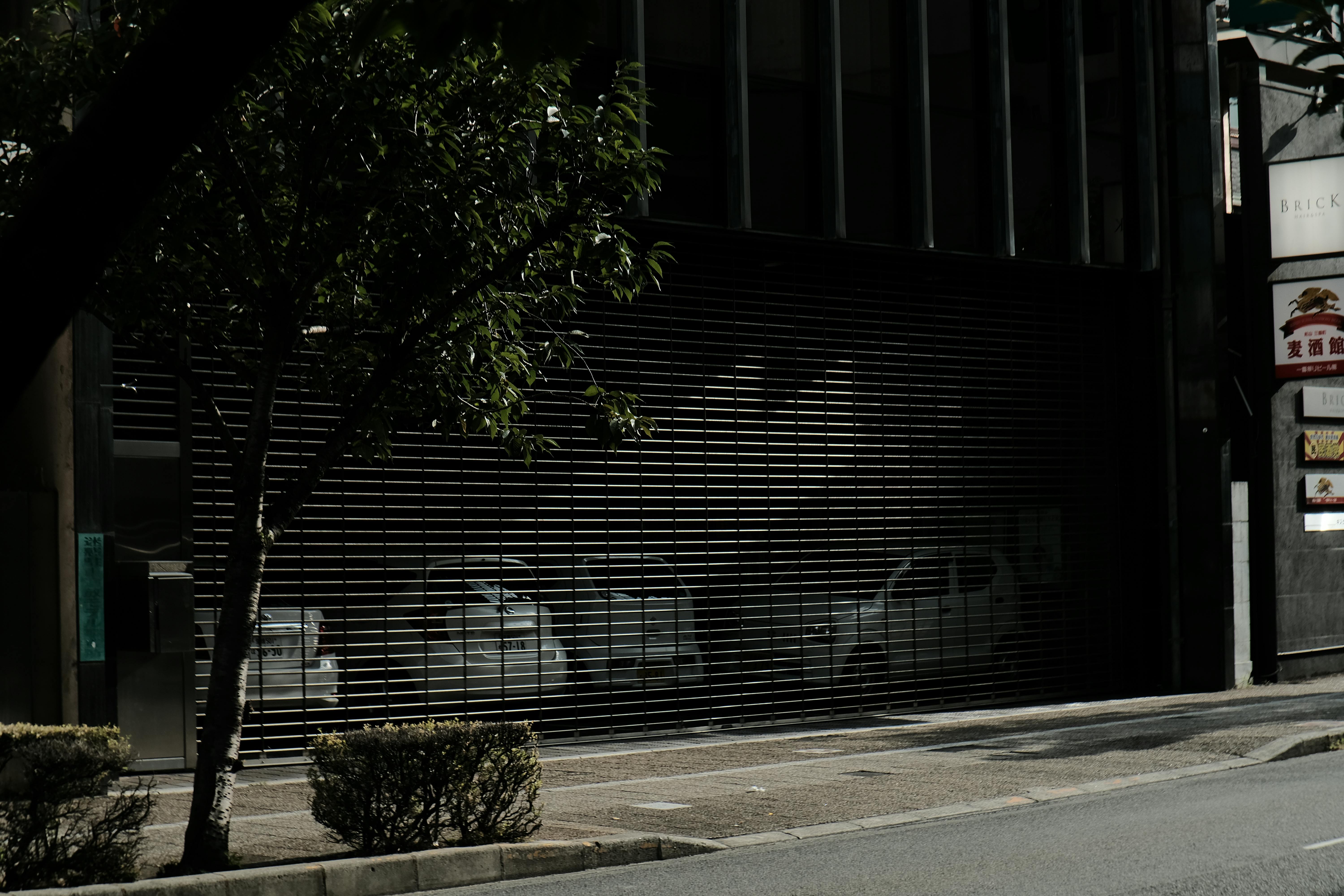 Urban Street Scene with Shuttered Building · Free Stock Photo