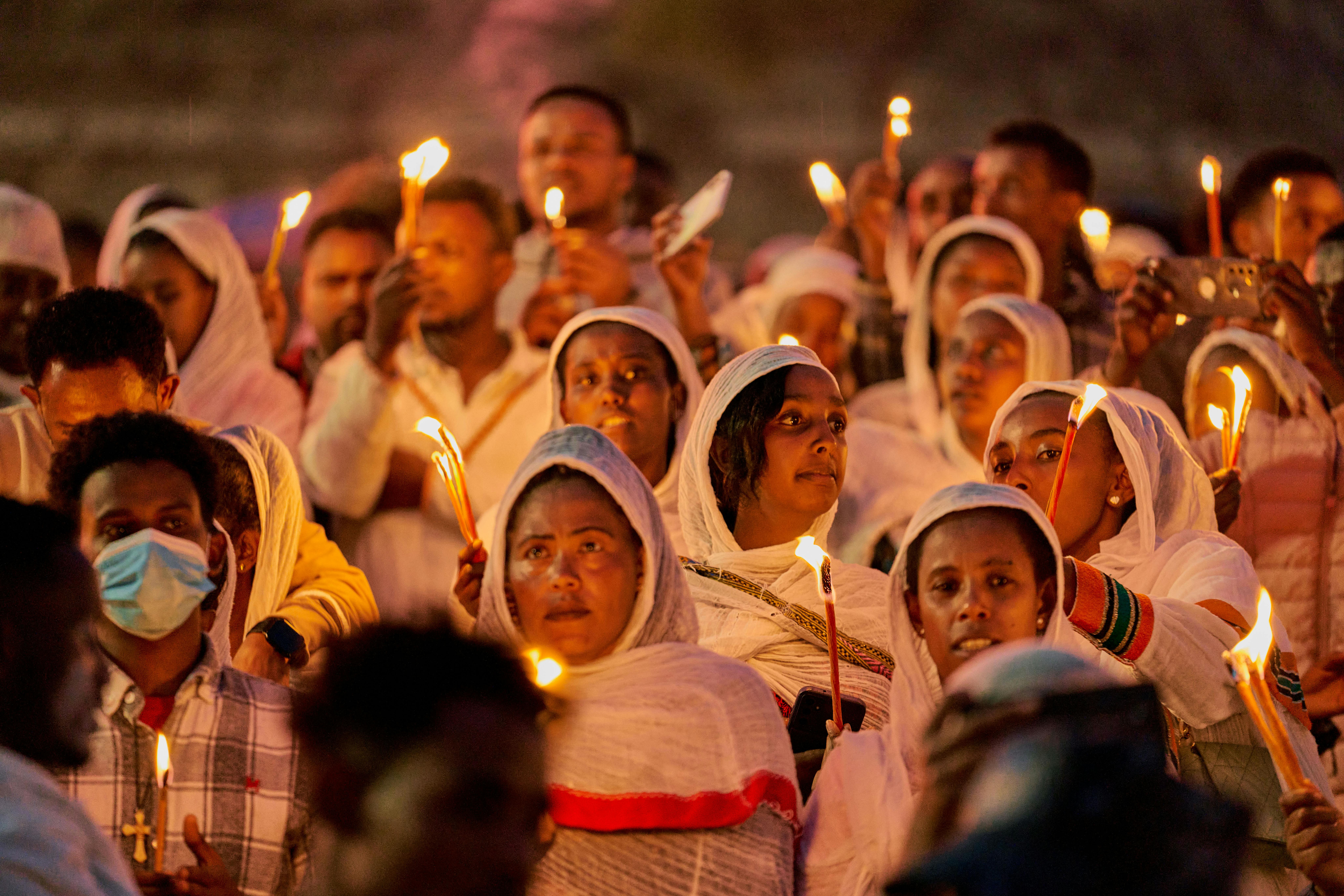 Candlelight Vigil Ceremony with Diverse Group · Free Stock Photo