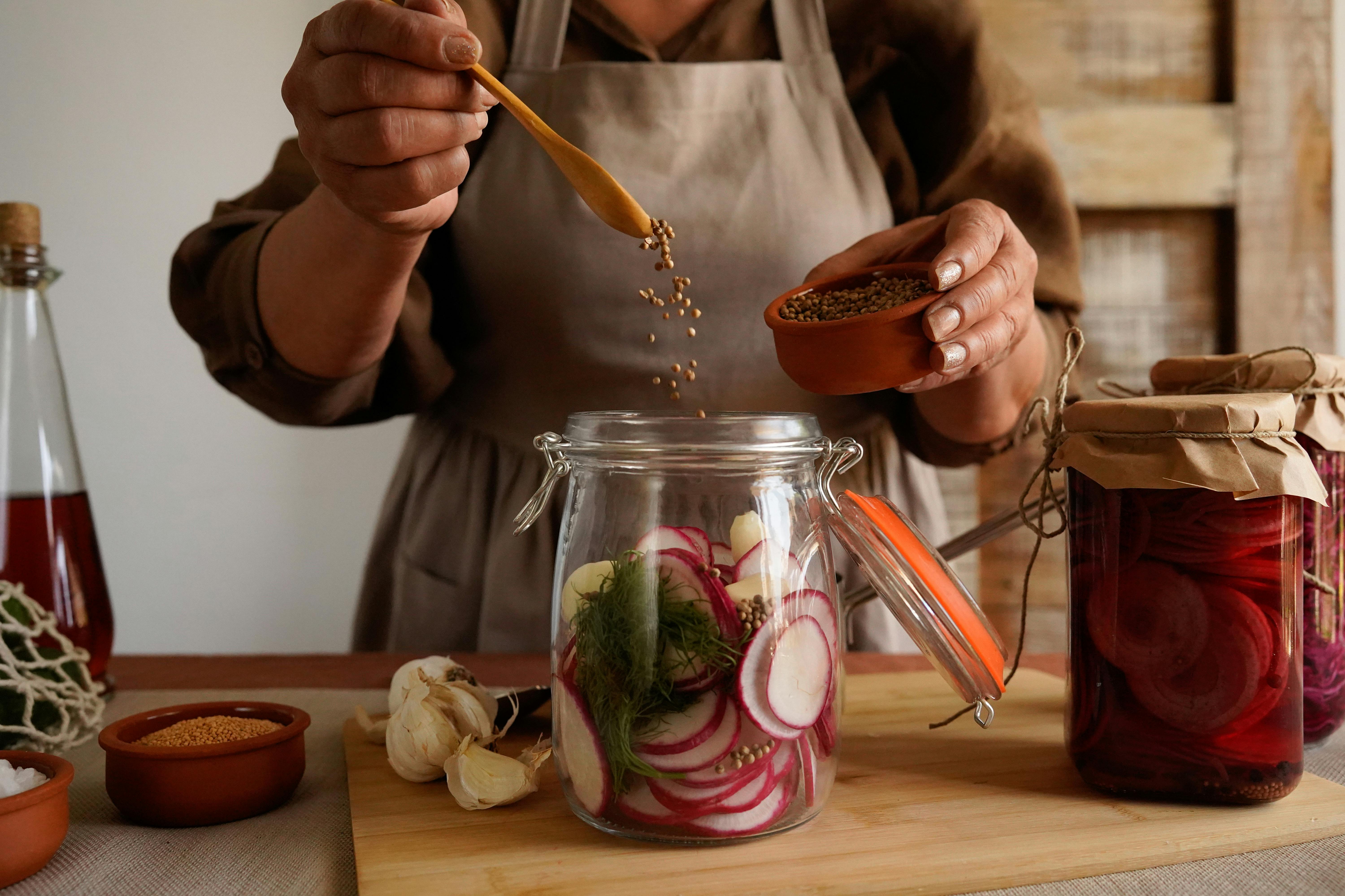 Homemade Pickling Process in Rustic Kitchen · Free Stock Photo